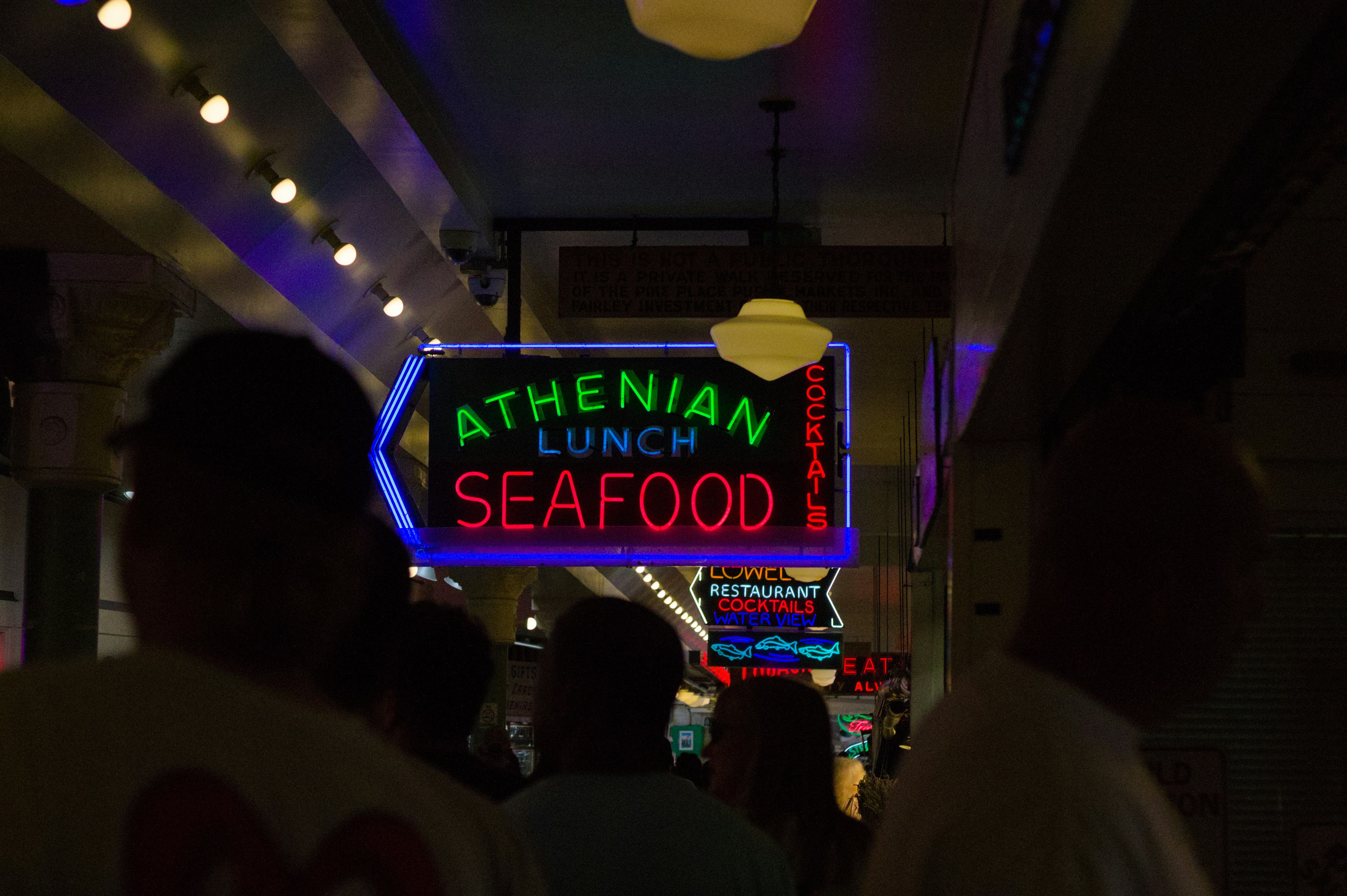 Neon Sign Overcrowded Alley: Athenaean Sea-Bright Neon
