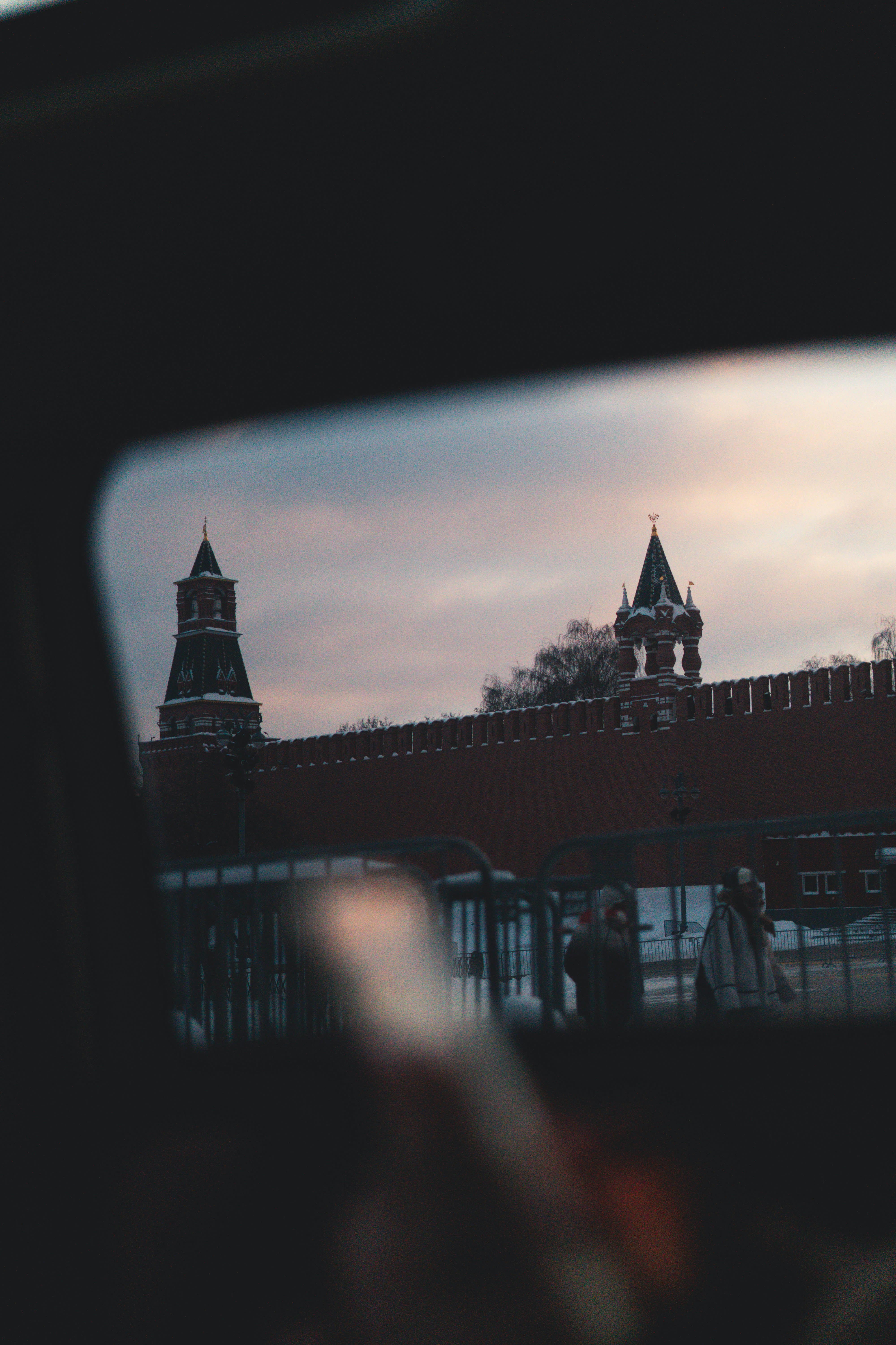 Evening View Through a Window: Kremlin Towers Framed by Cold Glass