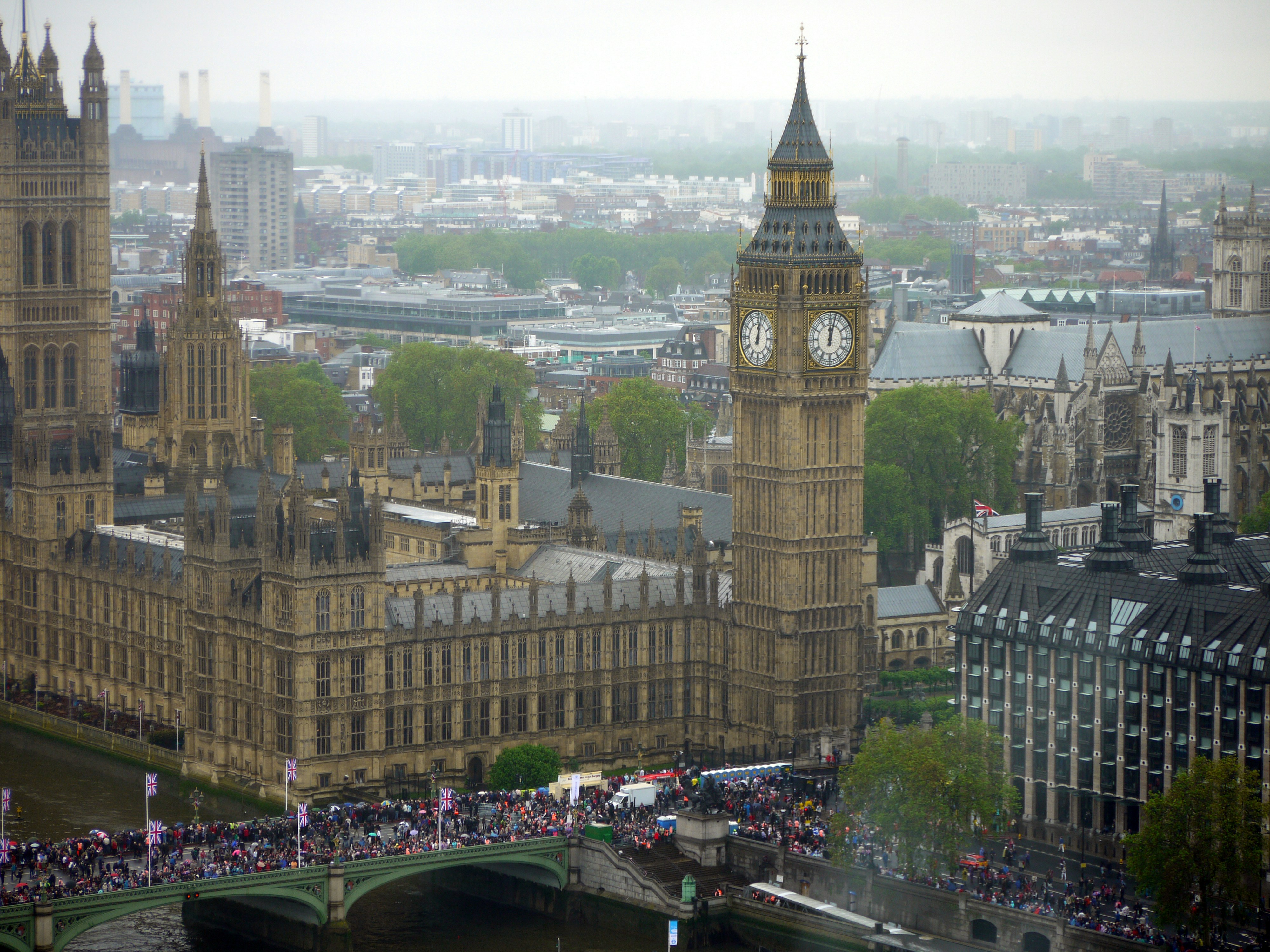 View from London Eye - Houses of Parliament, Big Ben and North West London on cloudy day - Queen Jubilee 2012