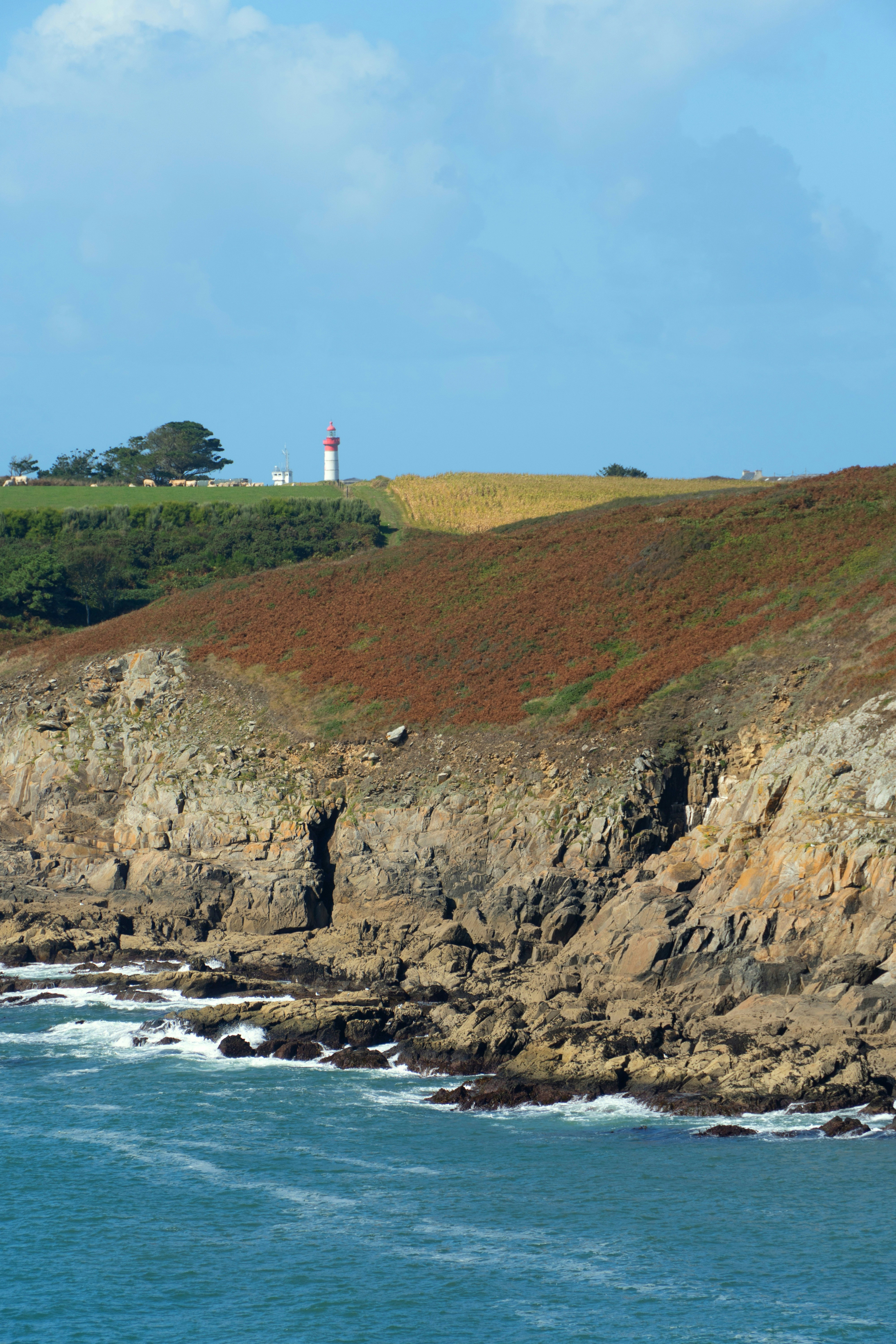 Lighthouse Sentinel atop Coastal Cliffs