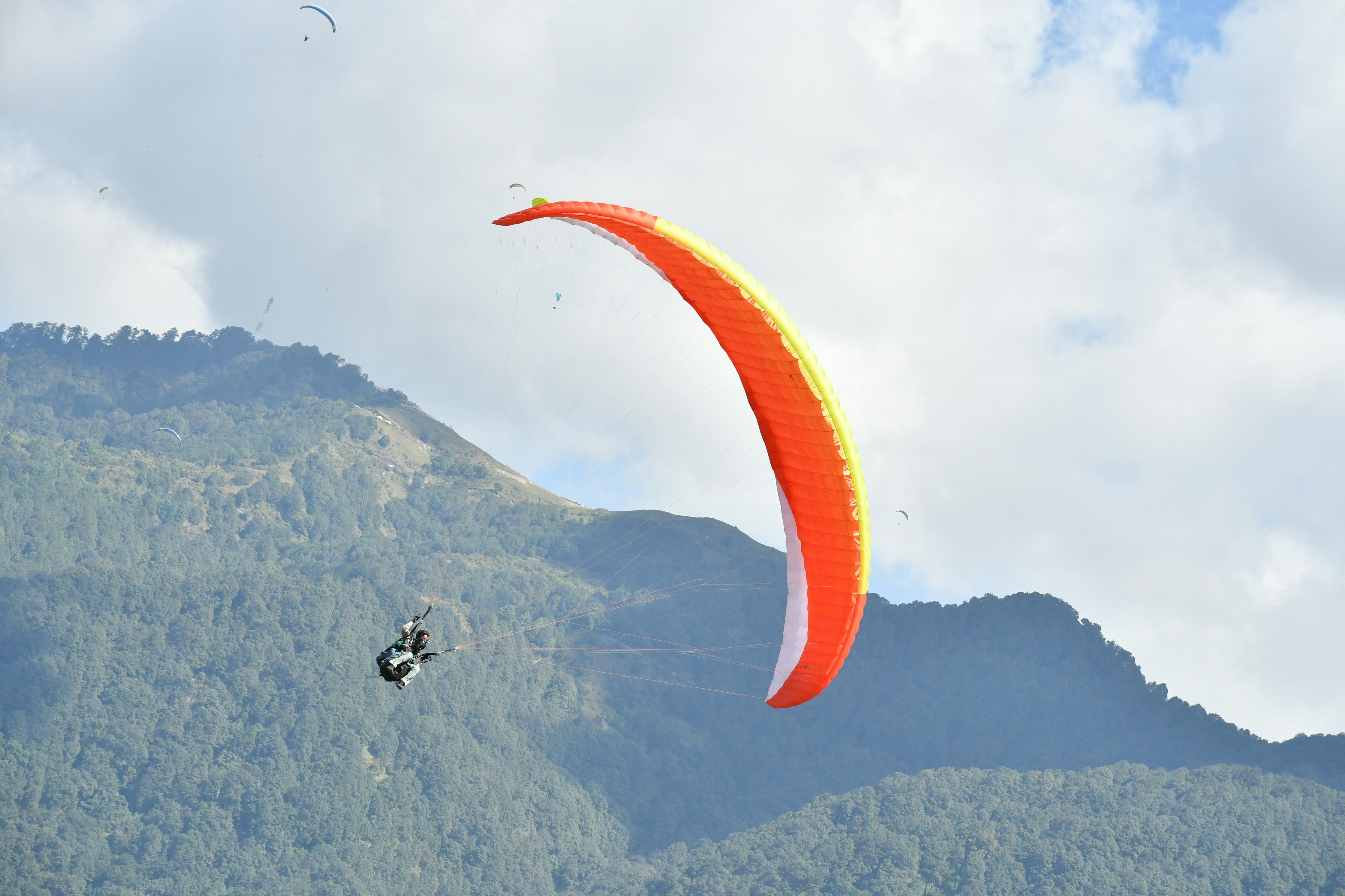 Crimson Arc Soaring above the Ridge