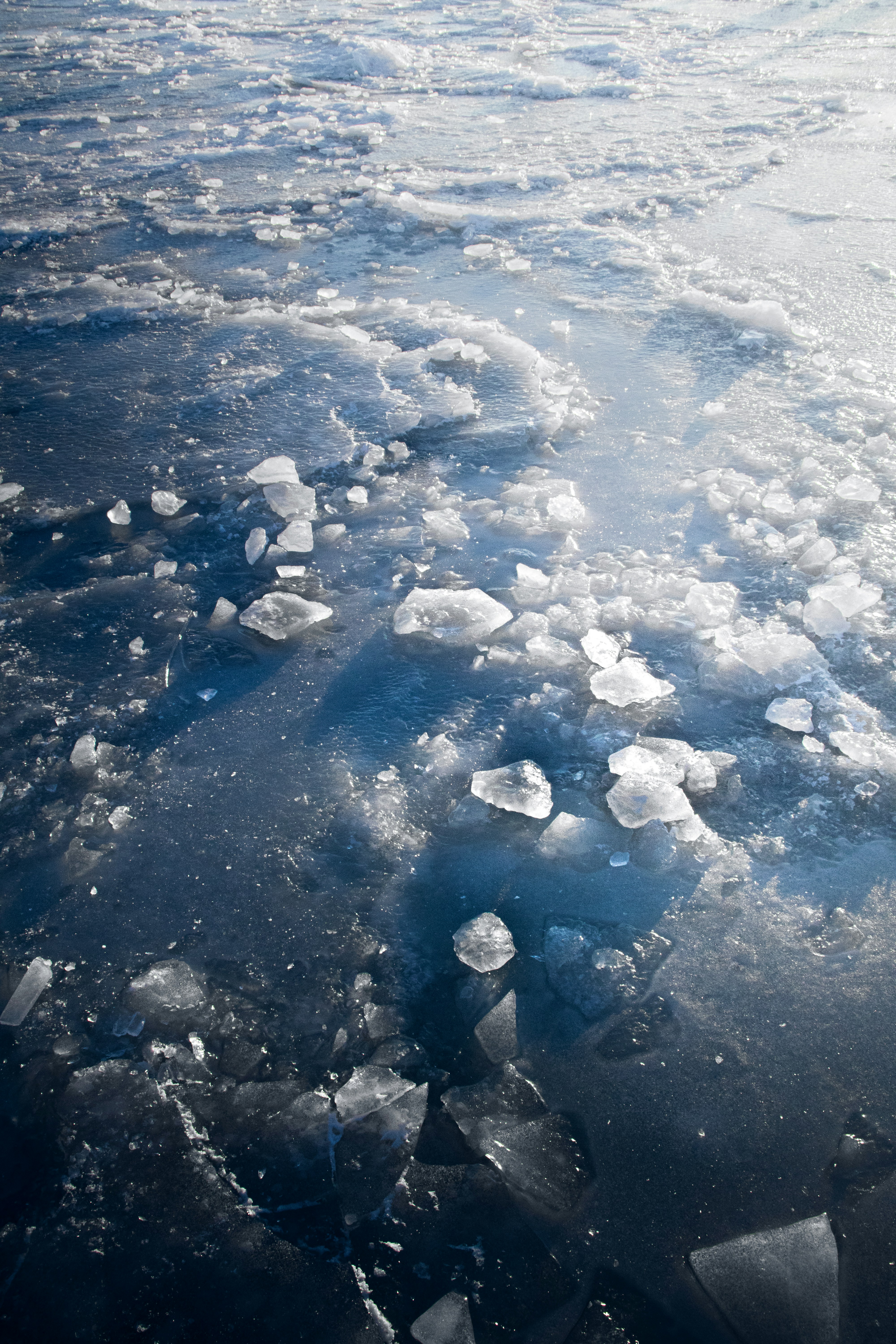 Icebound Cascade: Fragmented Ice Floes in Blue Silence