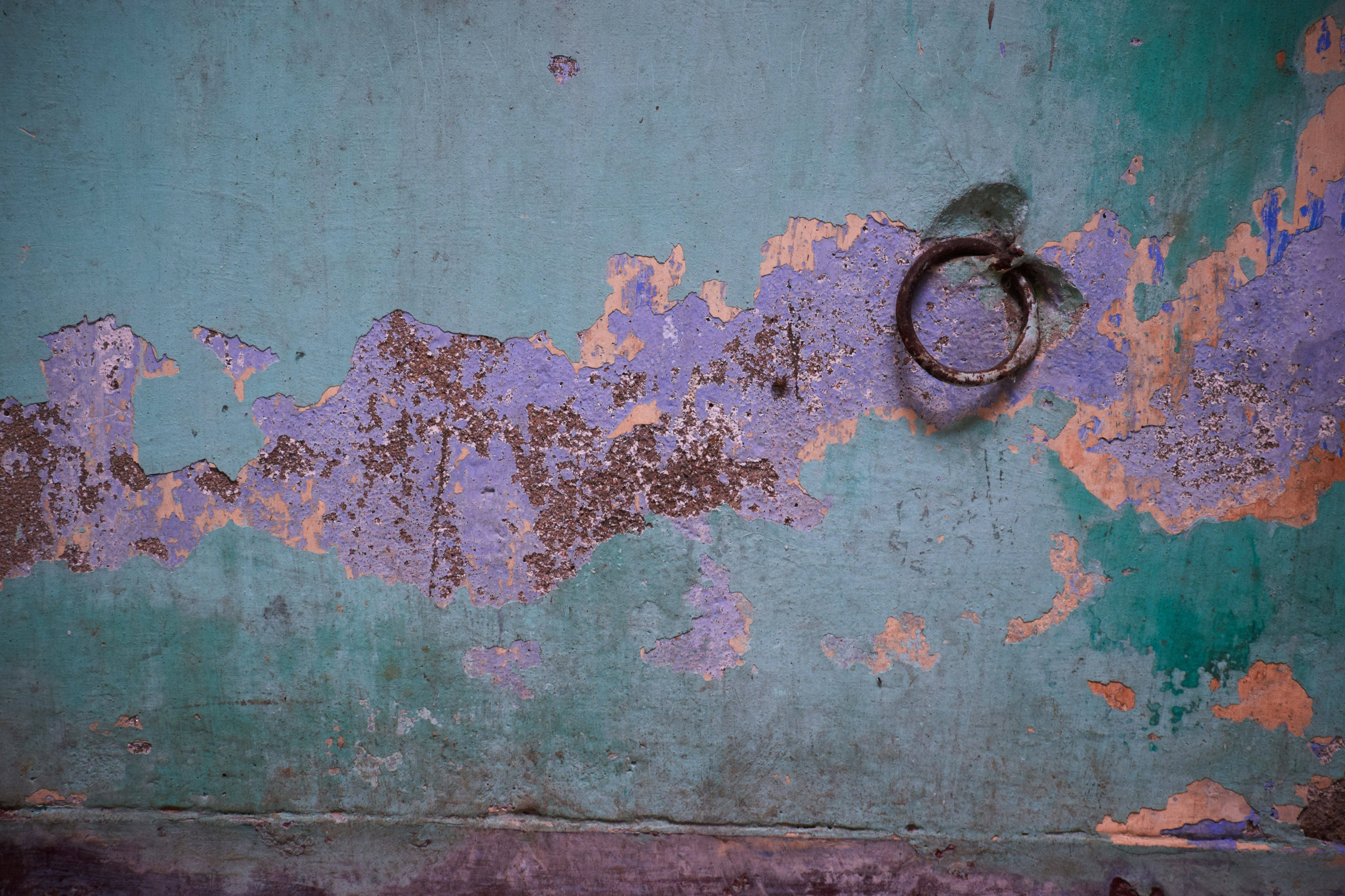 Ring of Rust: Peeling Paint and Weathered Wall