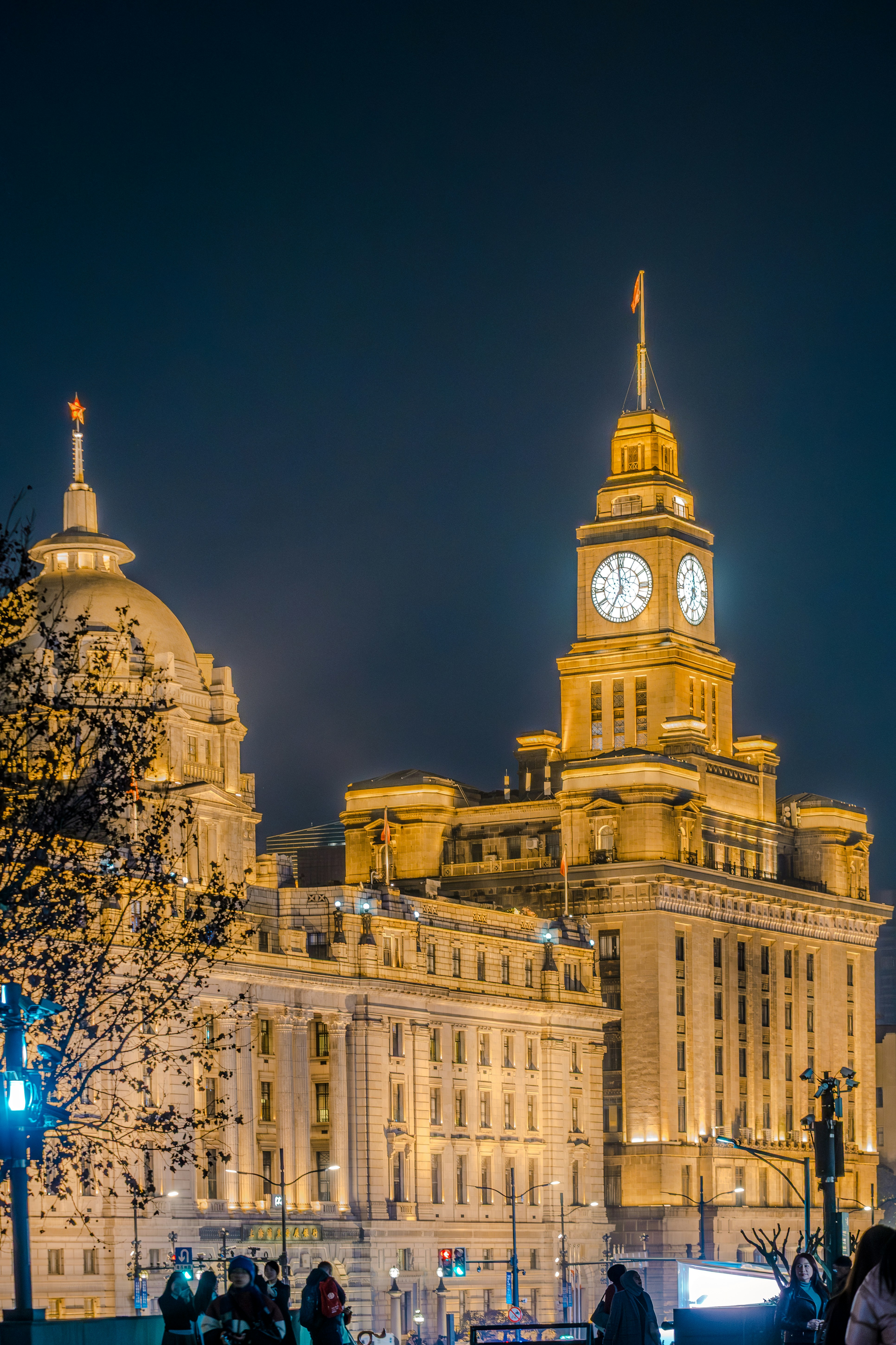 Golden Clock Tower at Night: An Urban Cascade of Light