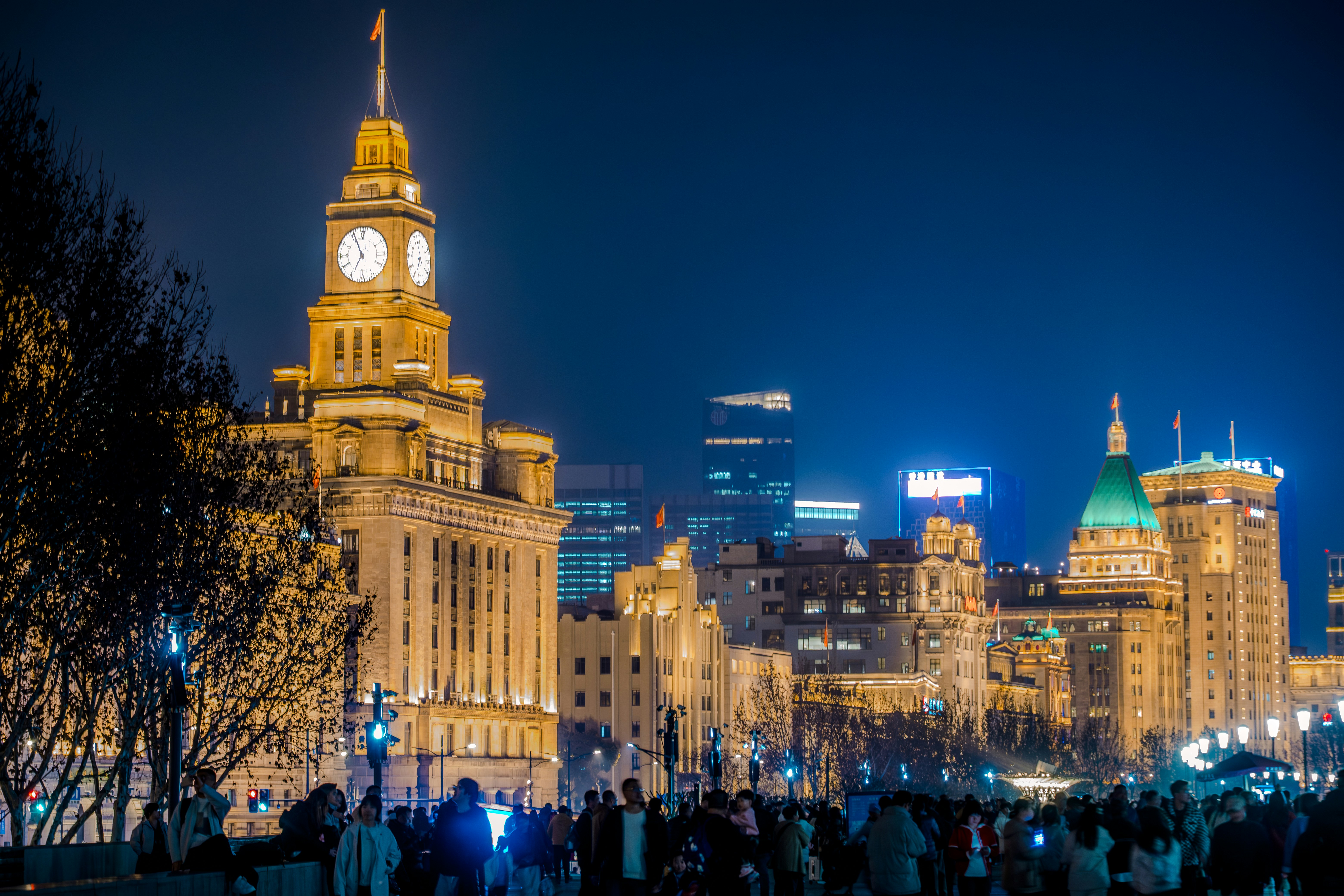 City Pulse at Twilight: Clock Tower and Crowd Silhouettes