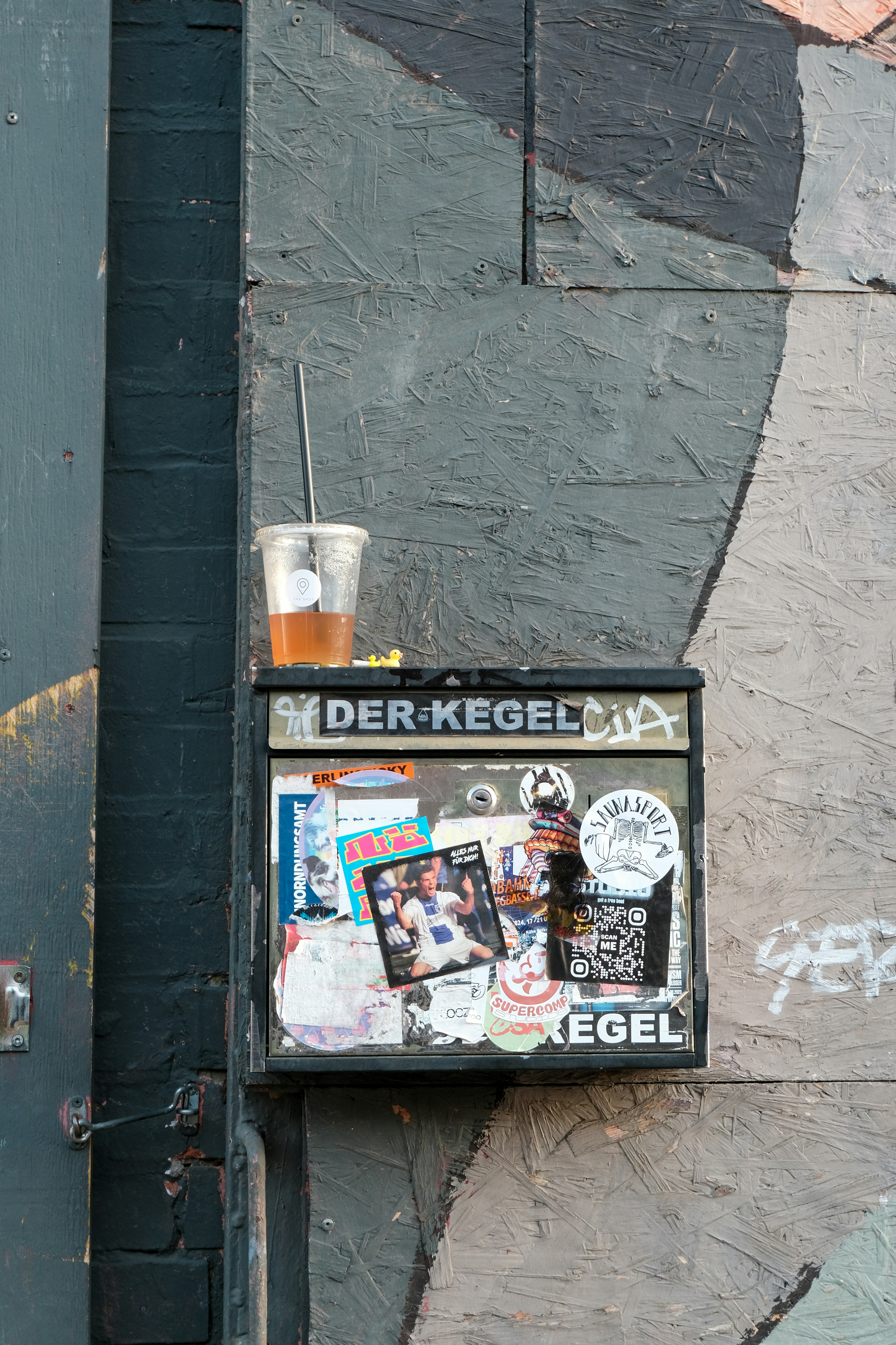 Stickered Mailbox with Drink Skew and Urban Graffiti
