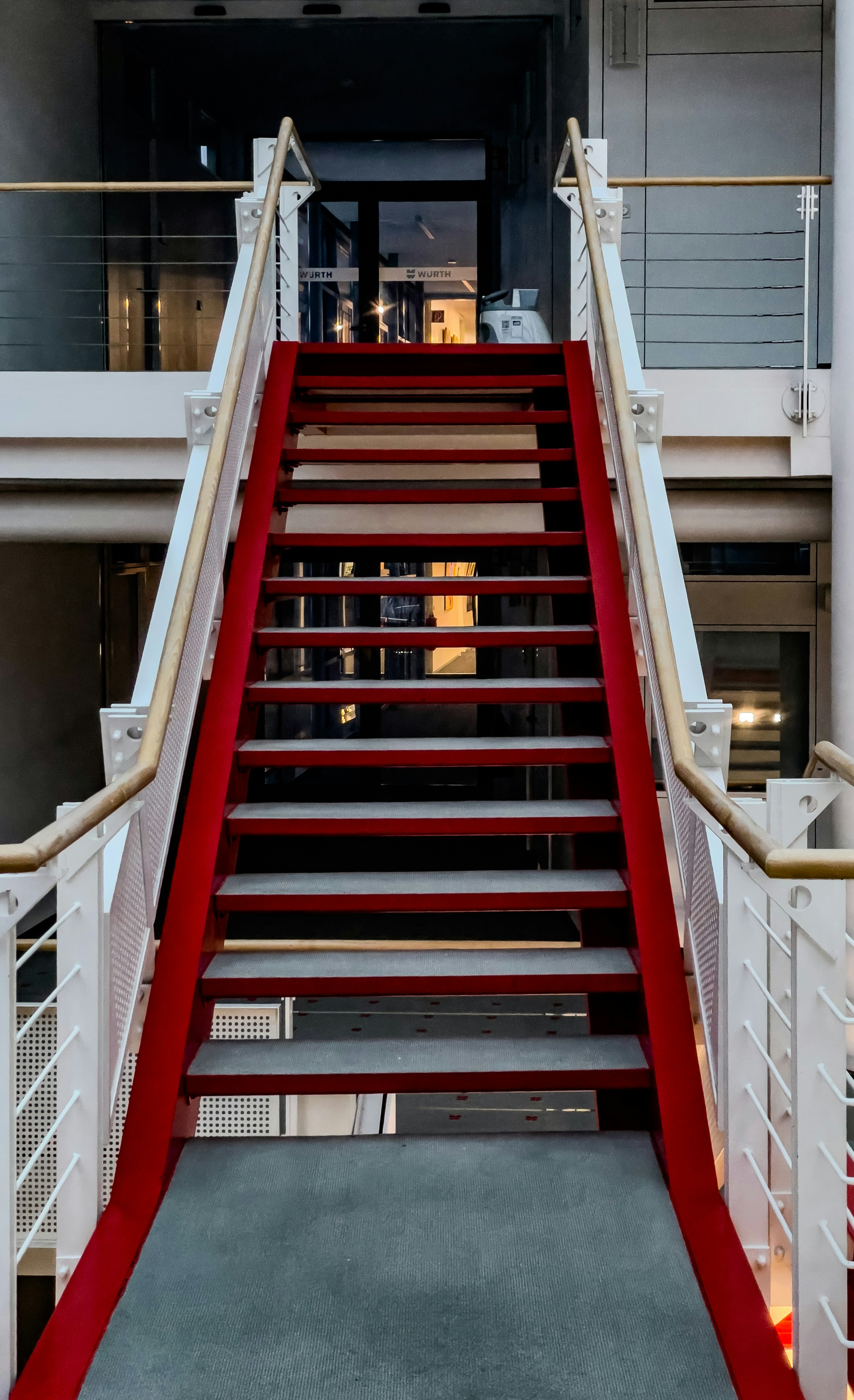 Crimson Staircase to the Quiet Floors