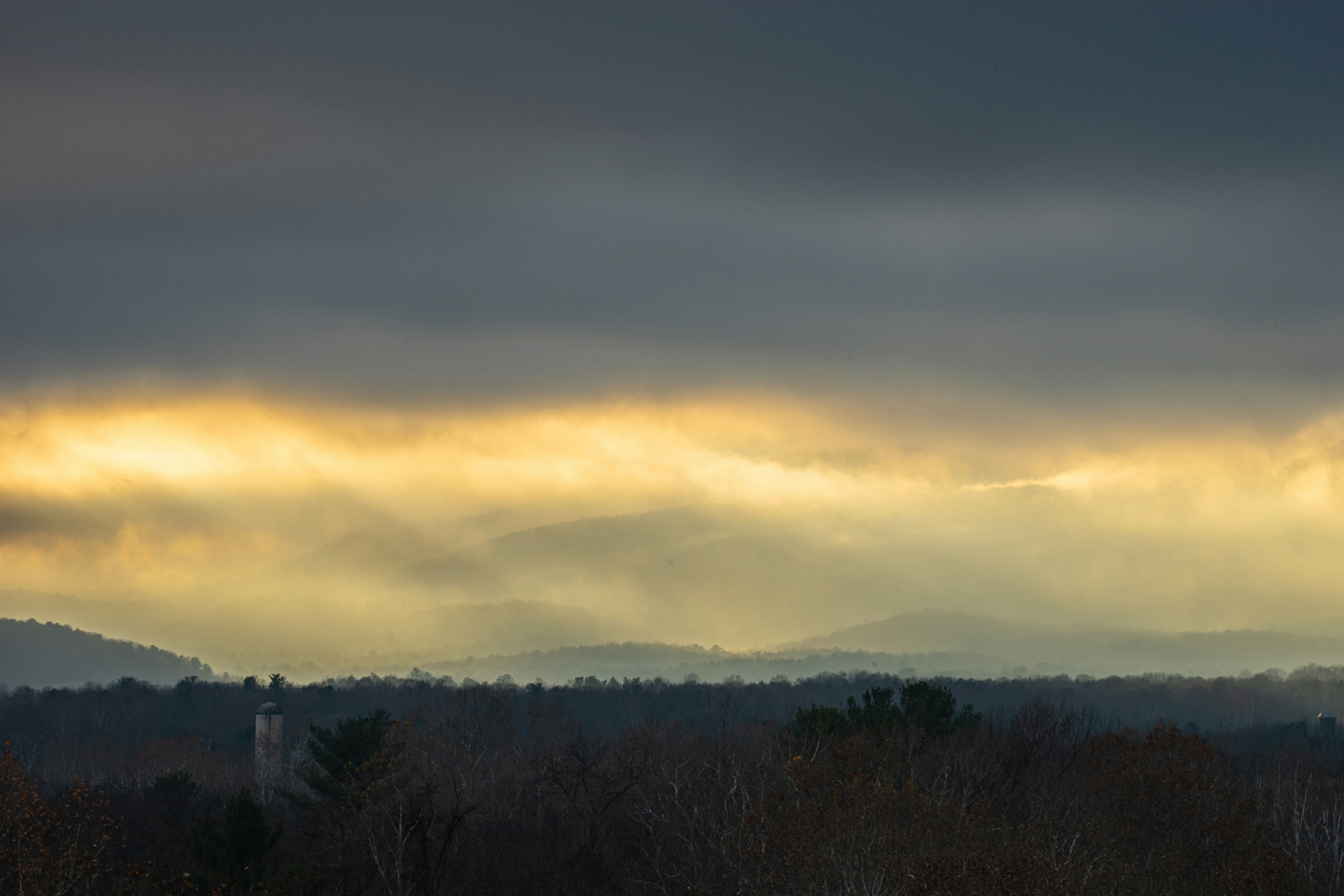 Golden Veil Over the Distant Hills