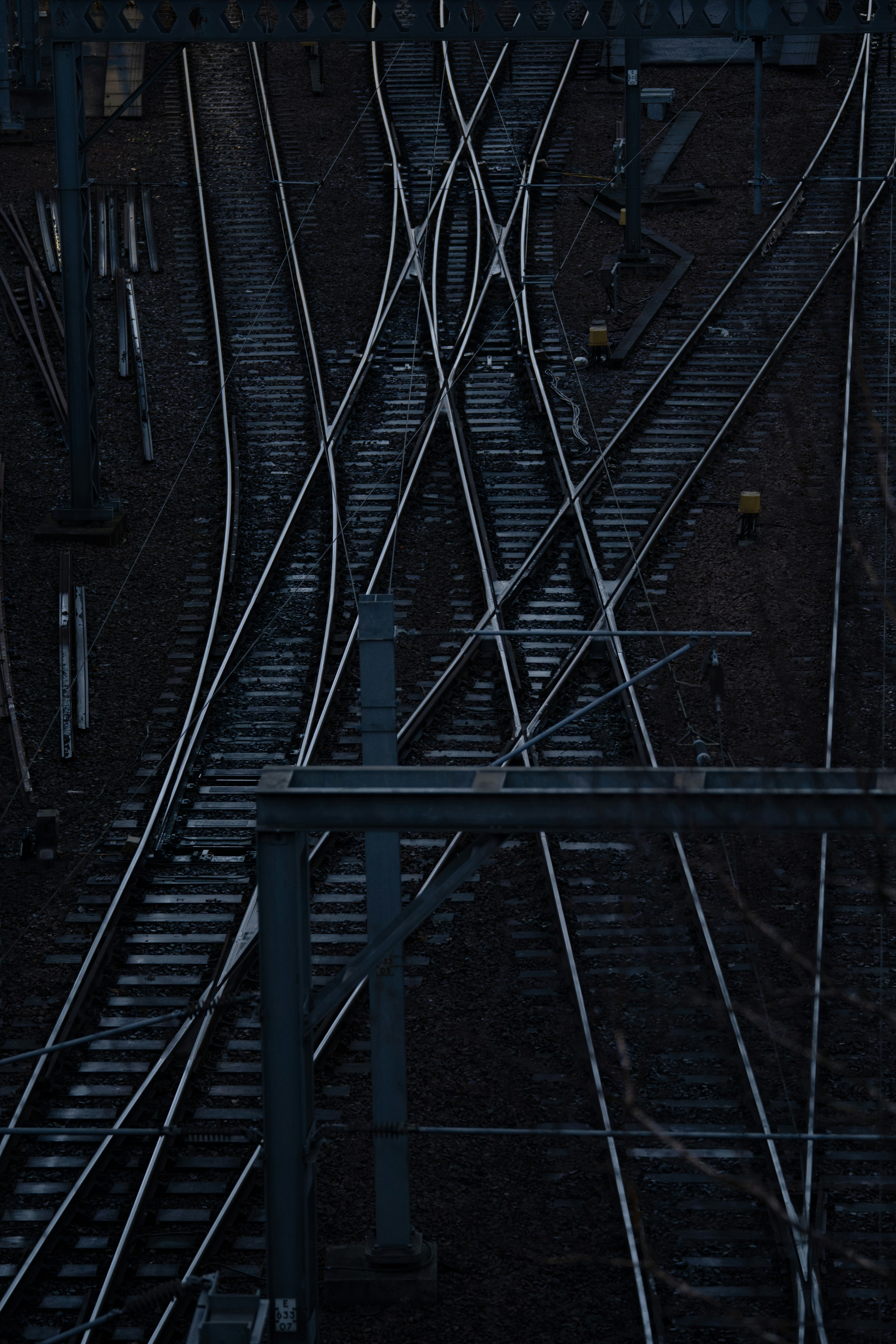 Crossed Rails in the Evening Grid