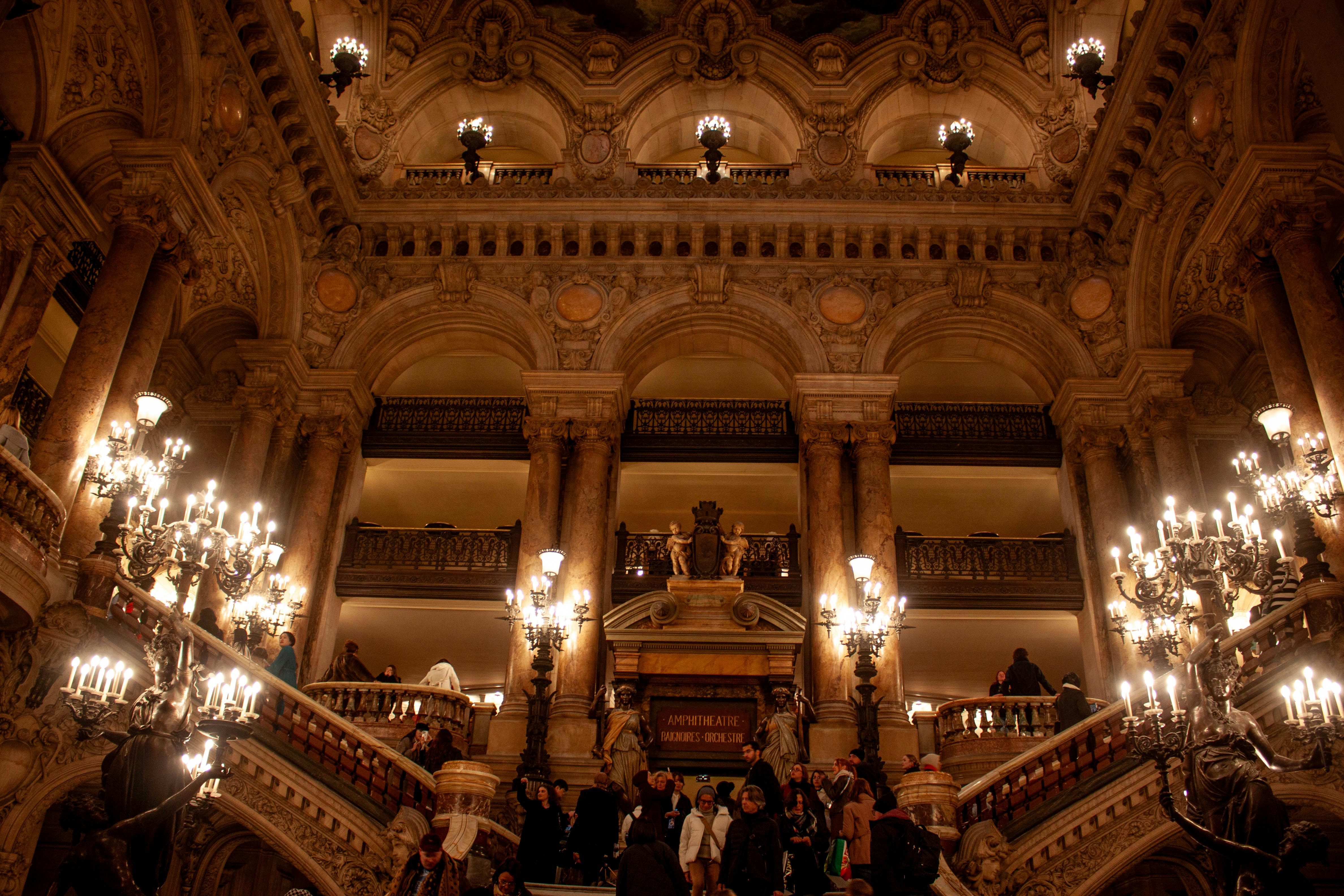 Emerald Staircase Reverie: Ornate Lobby Beneath Crystal Candelabra