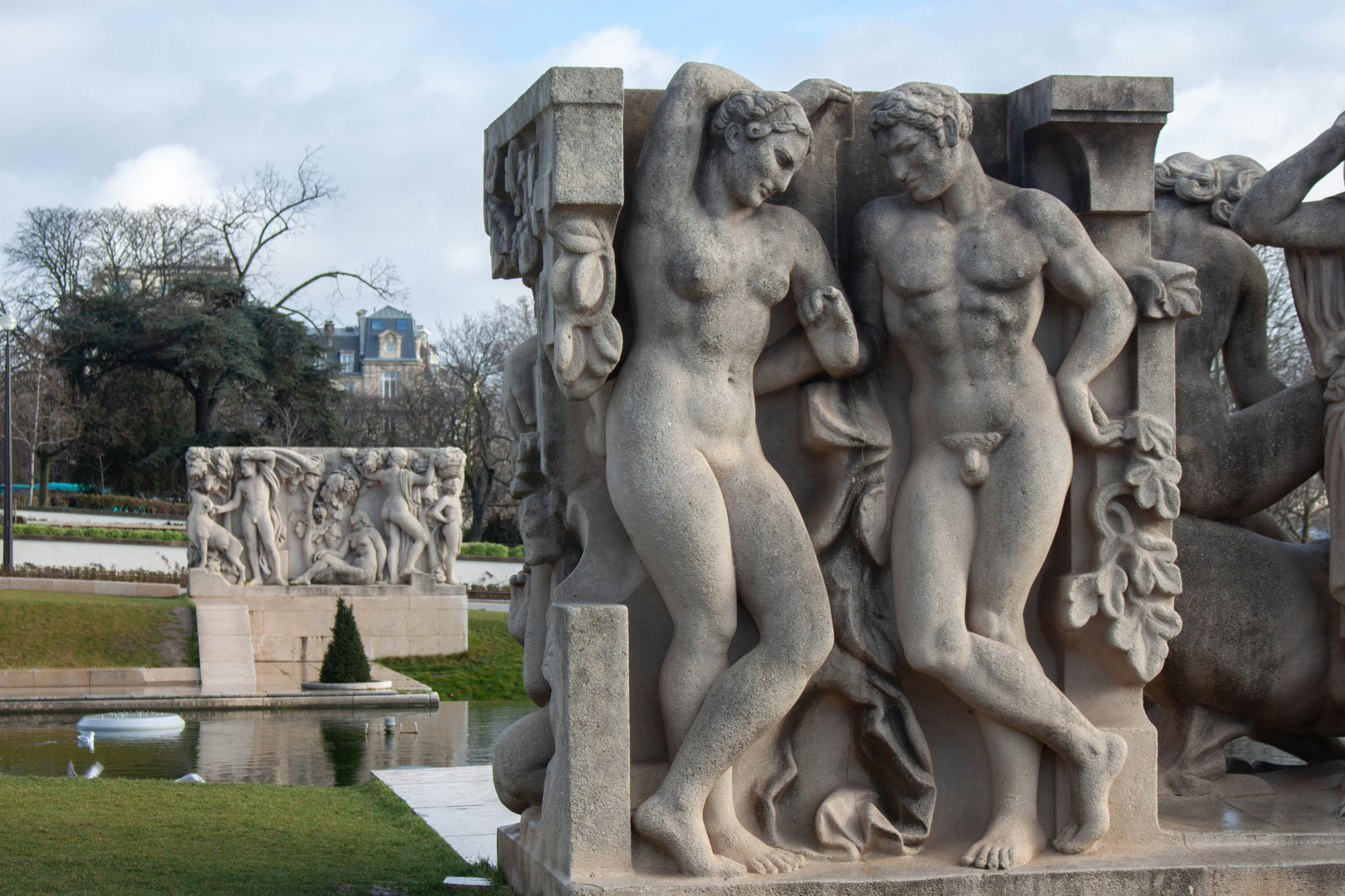 Stone Dialogues: A Pair of Naked Figures in Quiet Conversation