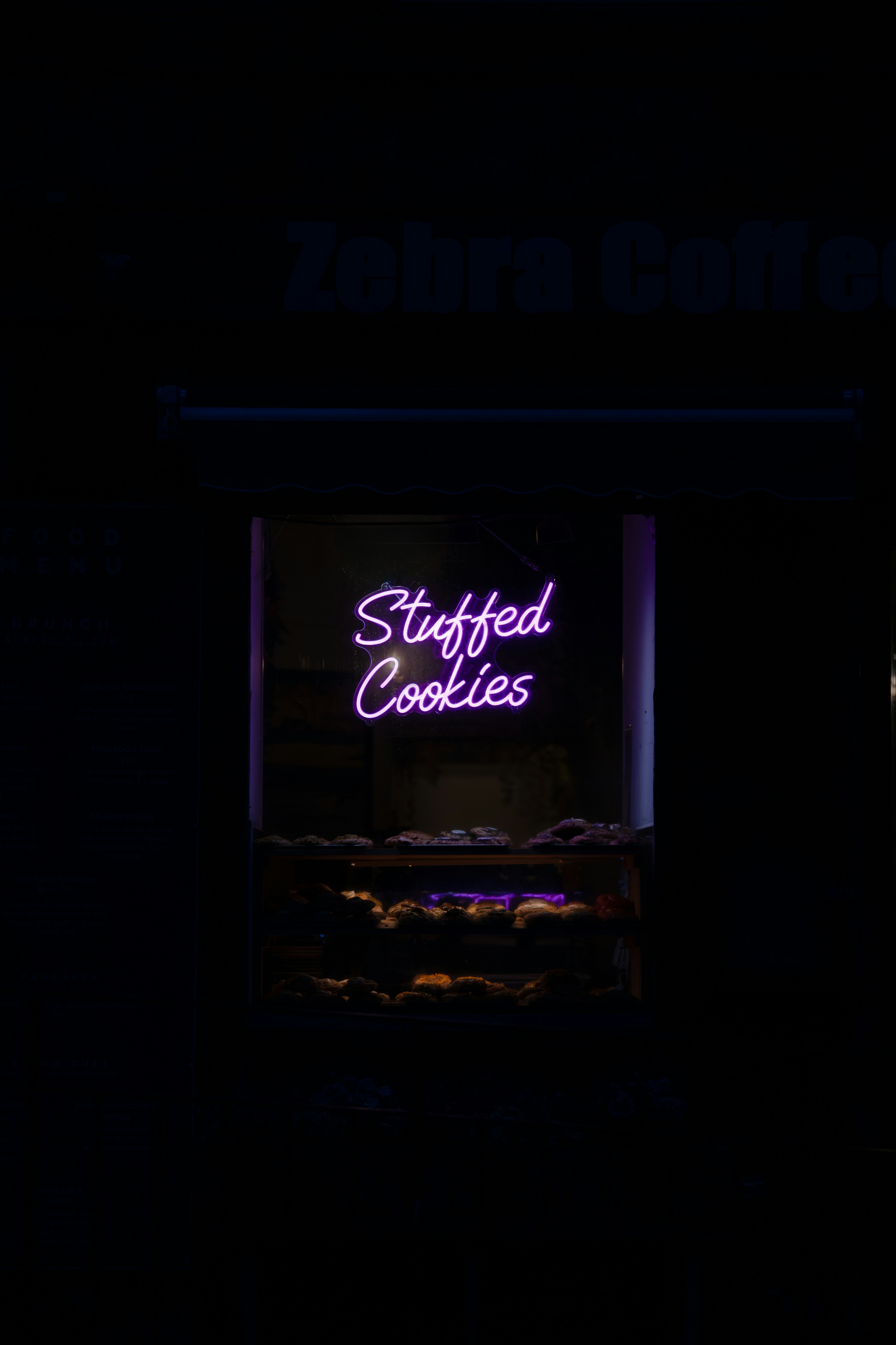 Neon Cookies: Night-window Glow in a Quiet Shop