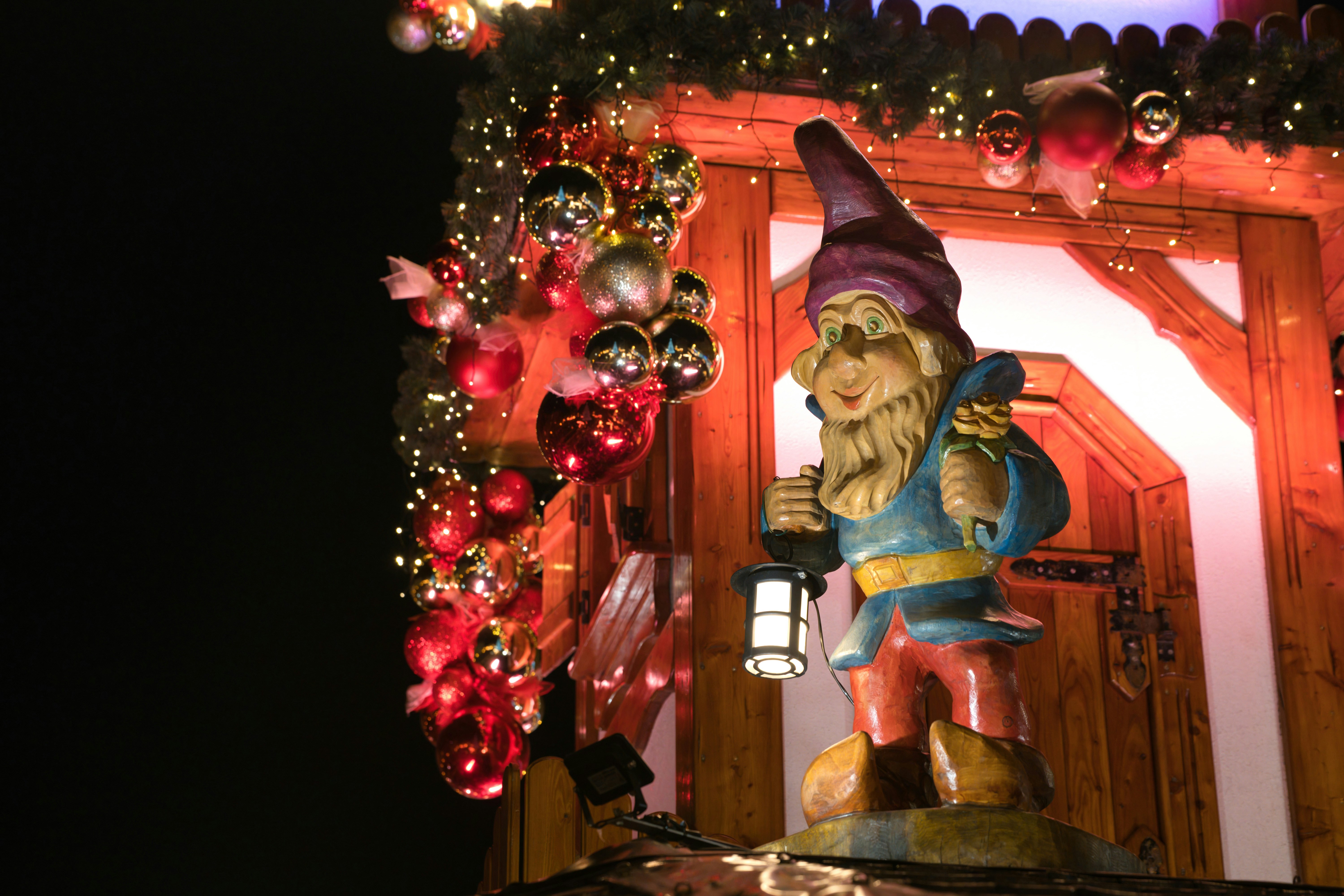 Gnome with Lantern: Festive Tower Scene