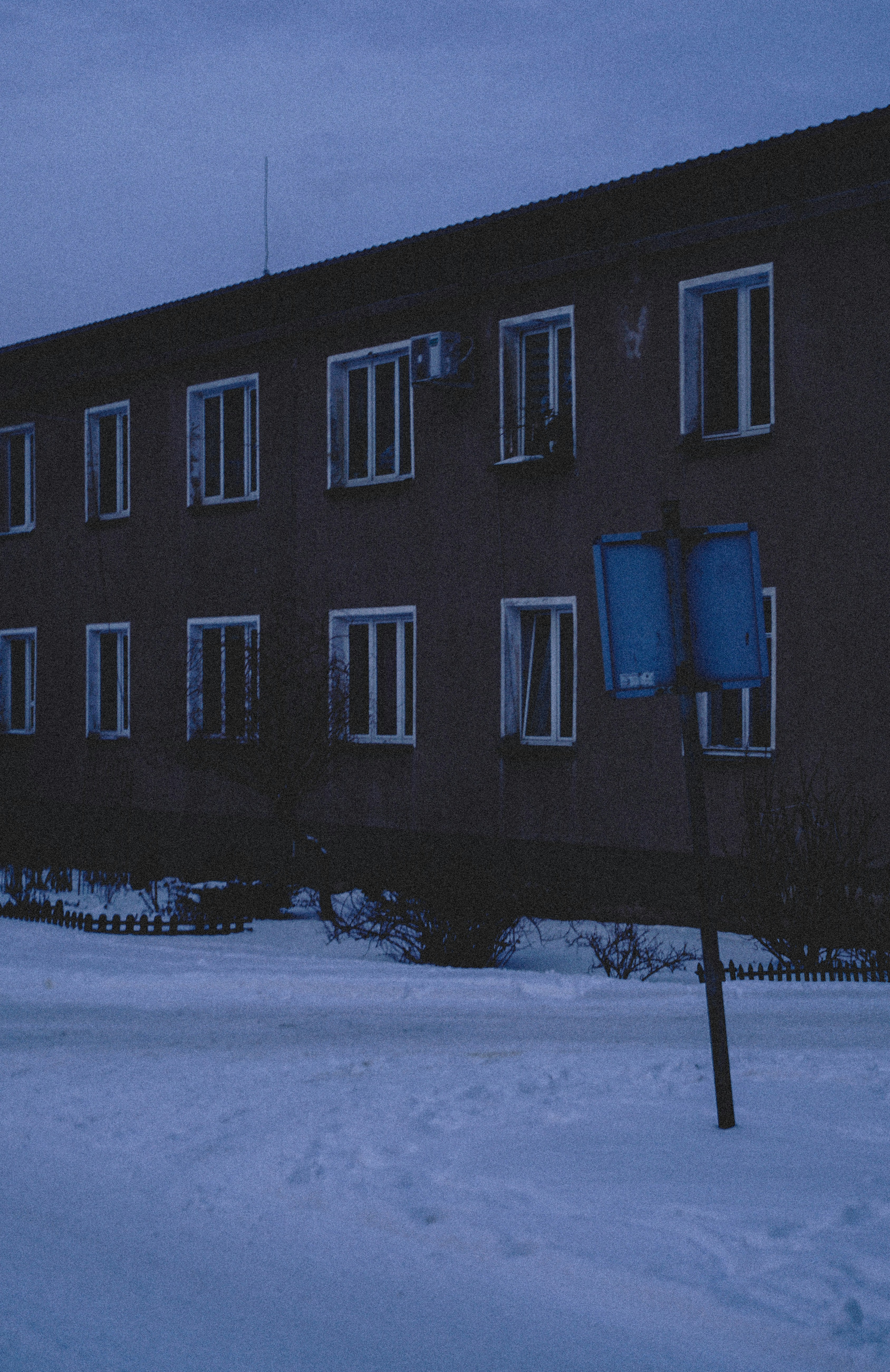 Blue Hour Facade: Quiet Apartment Block in Winter Light