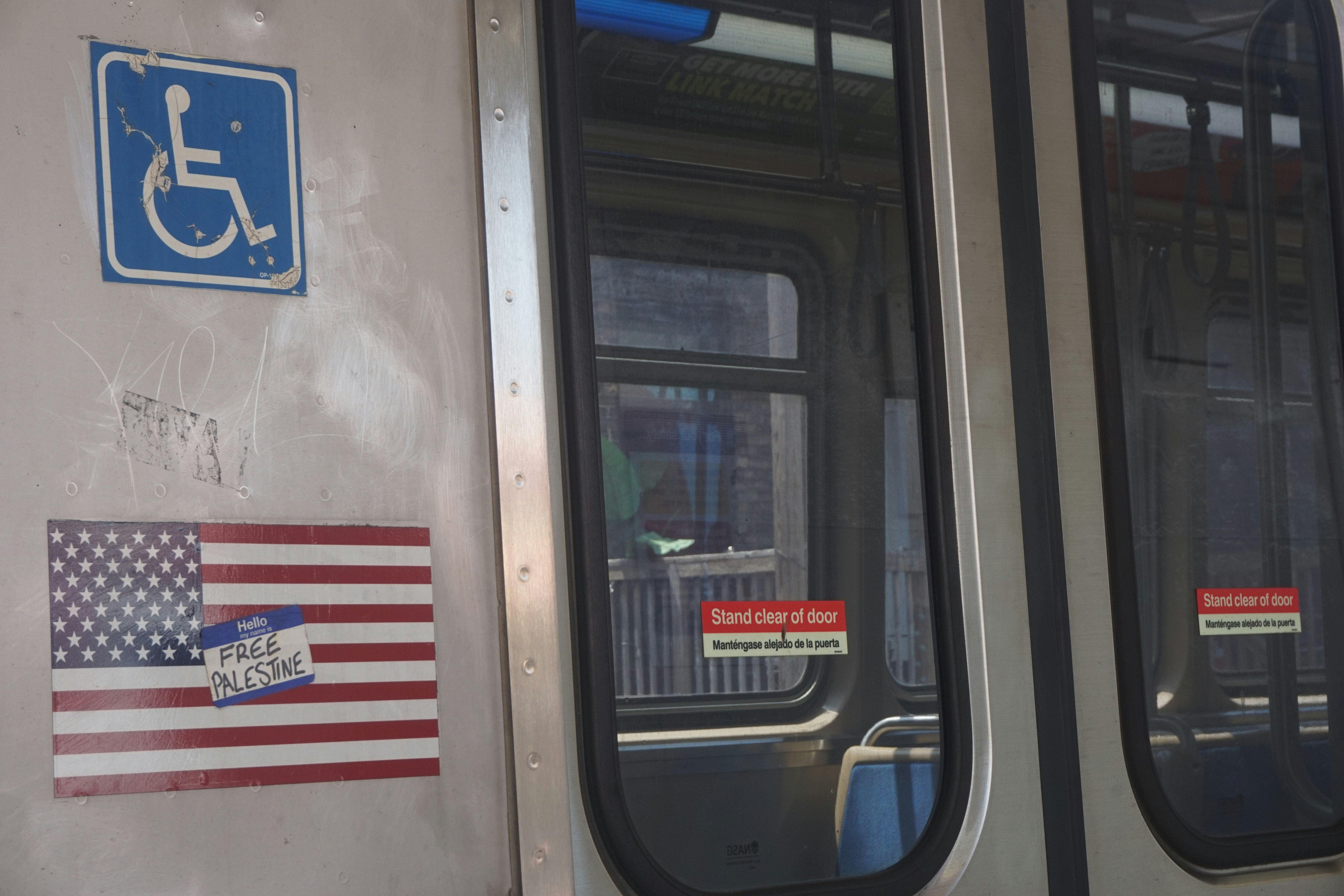 Stickered Subway Quietude: A Window into Public Transit Stillness