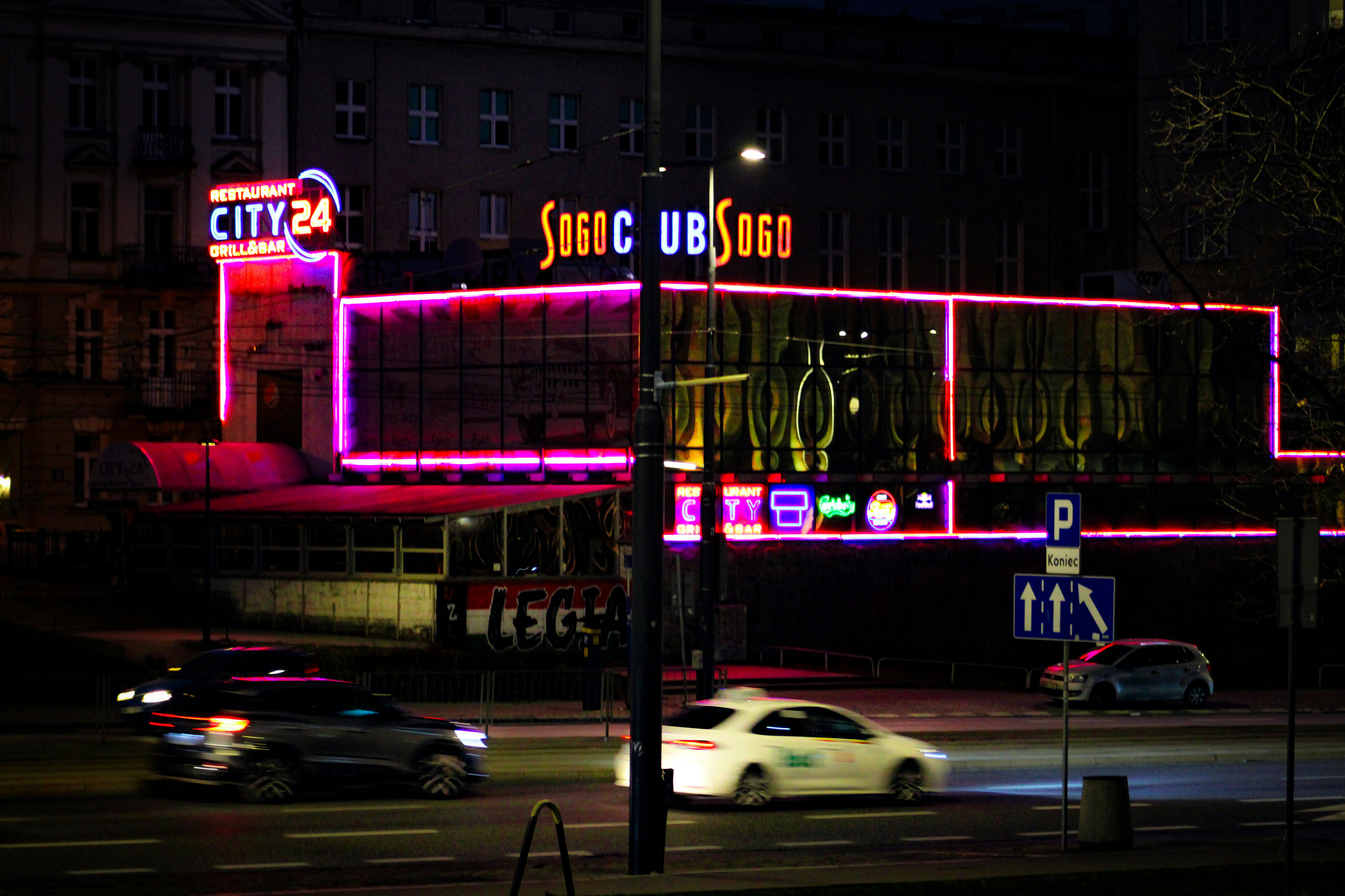Neon Outline of a Nighttime City Bar