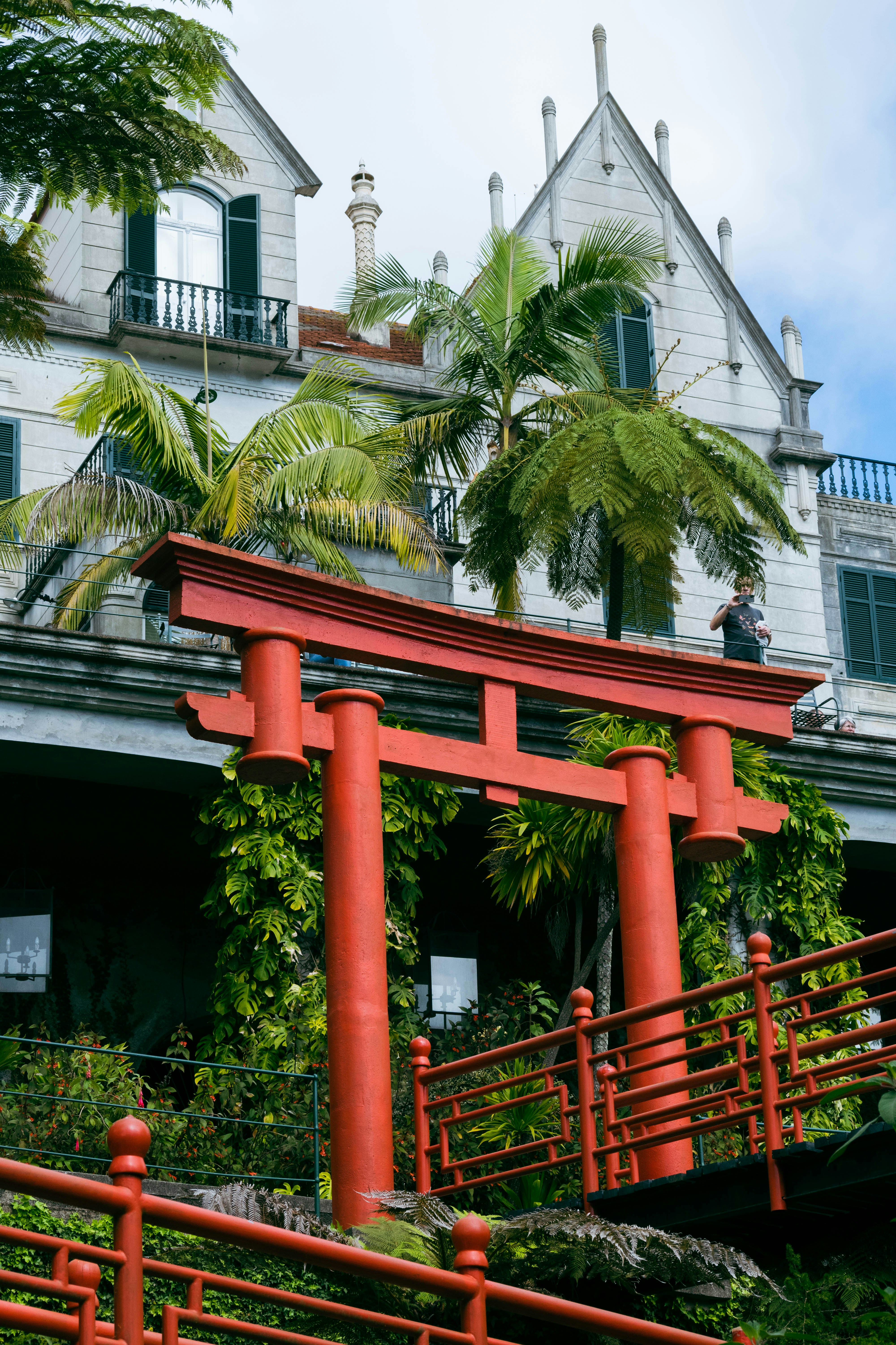 Crimson Torii Framing a Historic Terrace