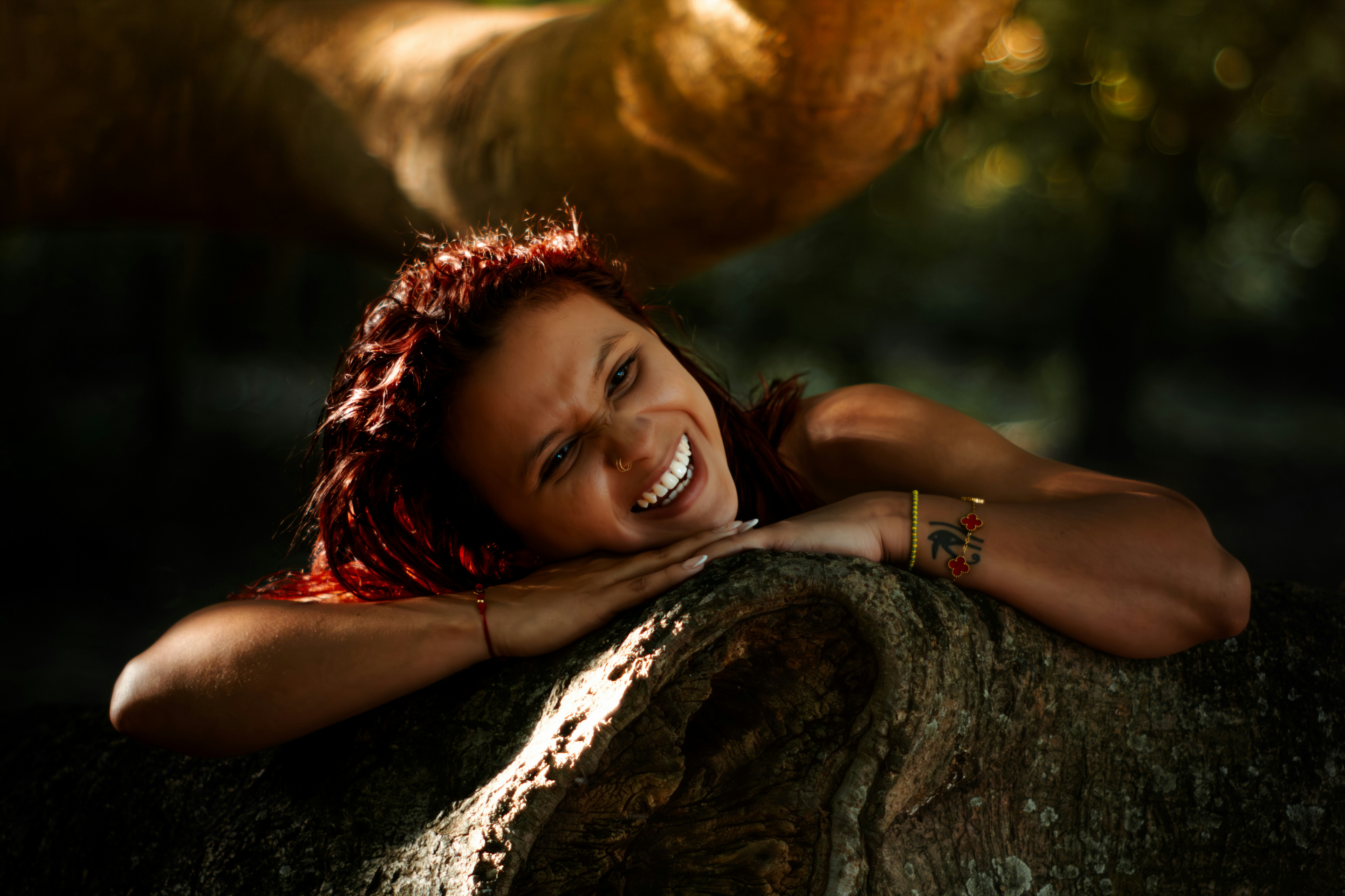 Sunlit Grin over a Mossy Bend