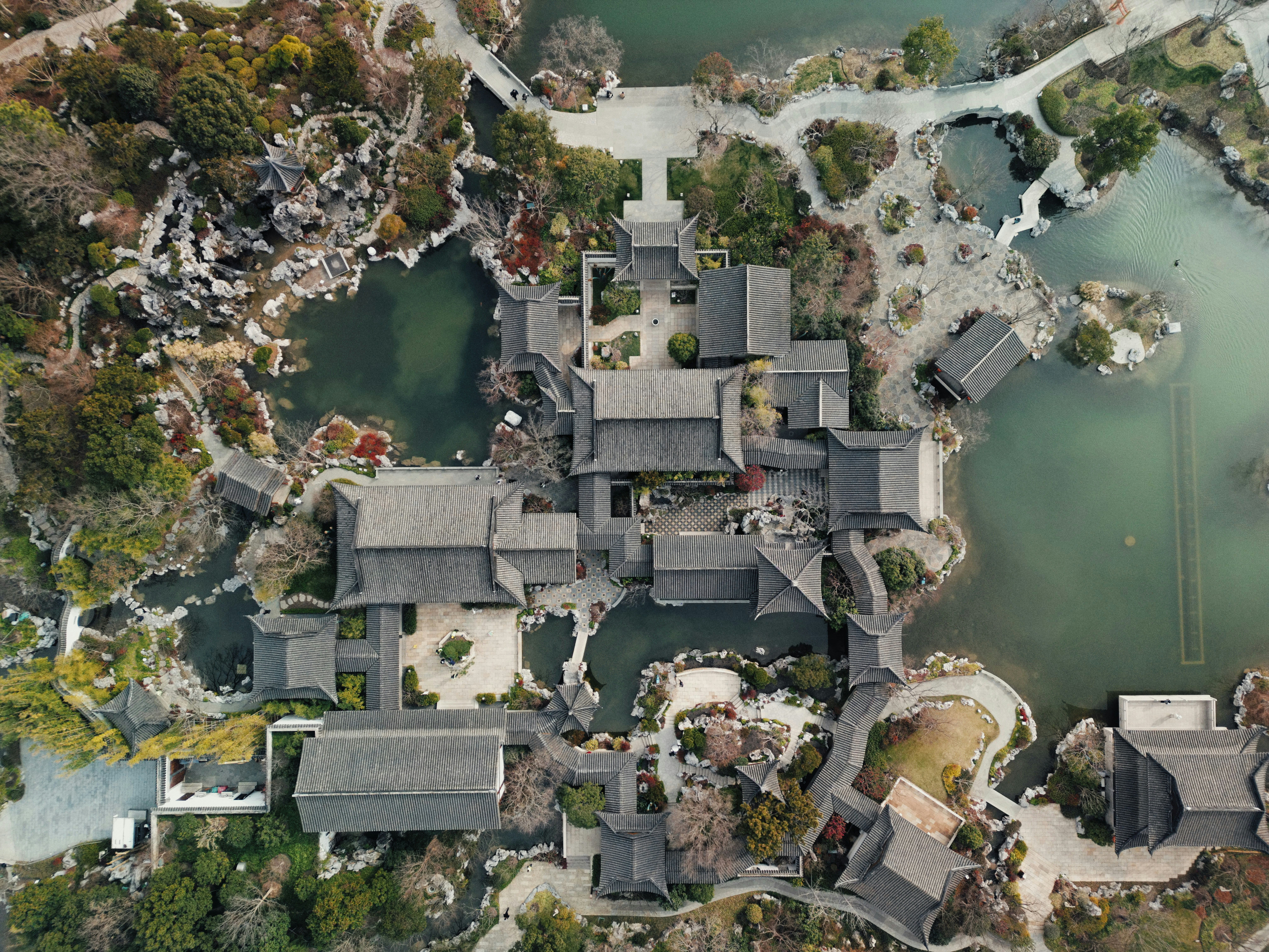 Aerial Tangle of Traditional Pavilions on Serene Waters