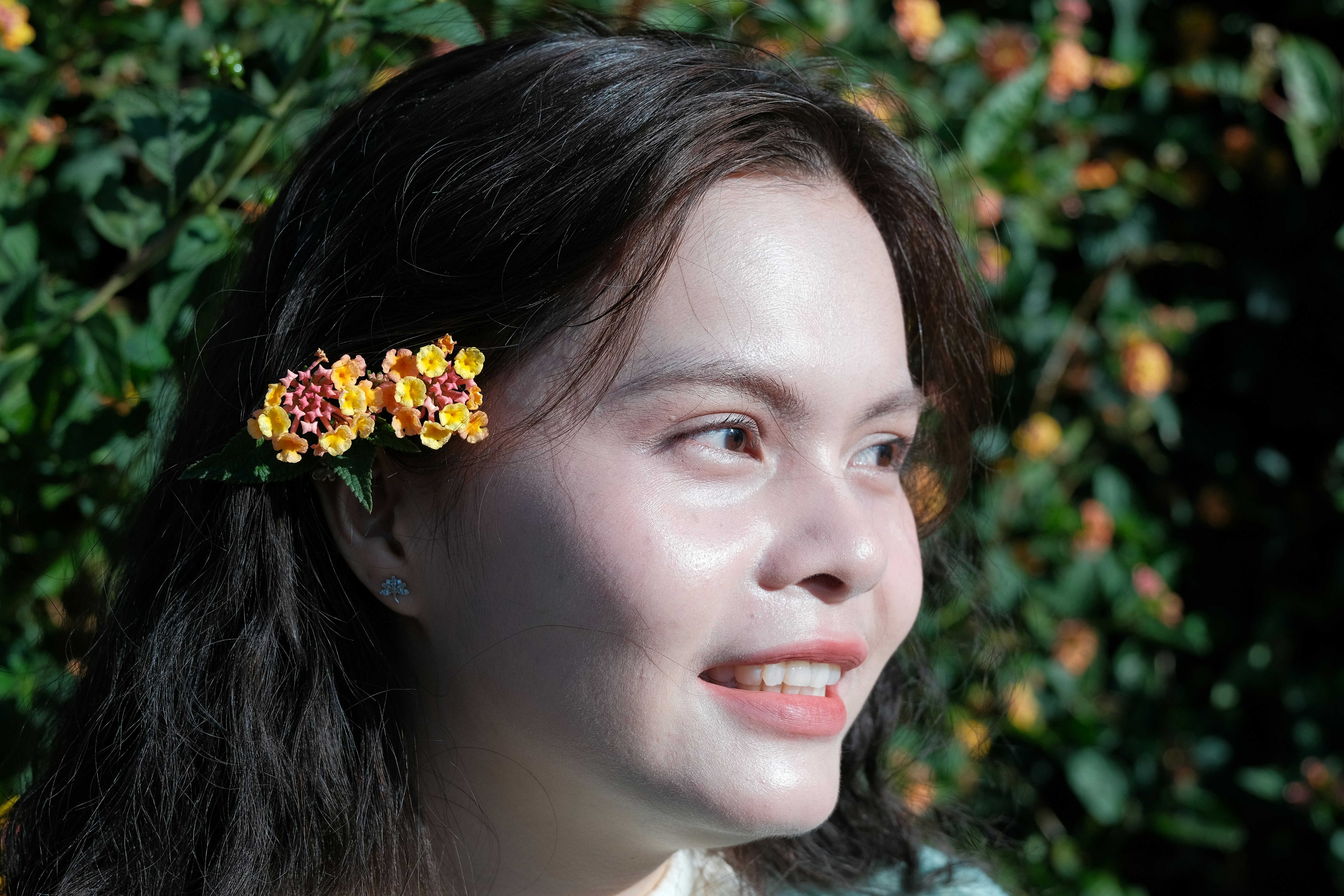 Sunlit Portrait of a Flower-adorned Look