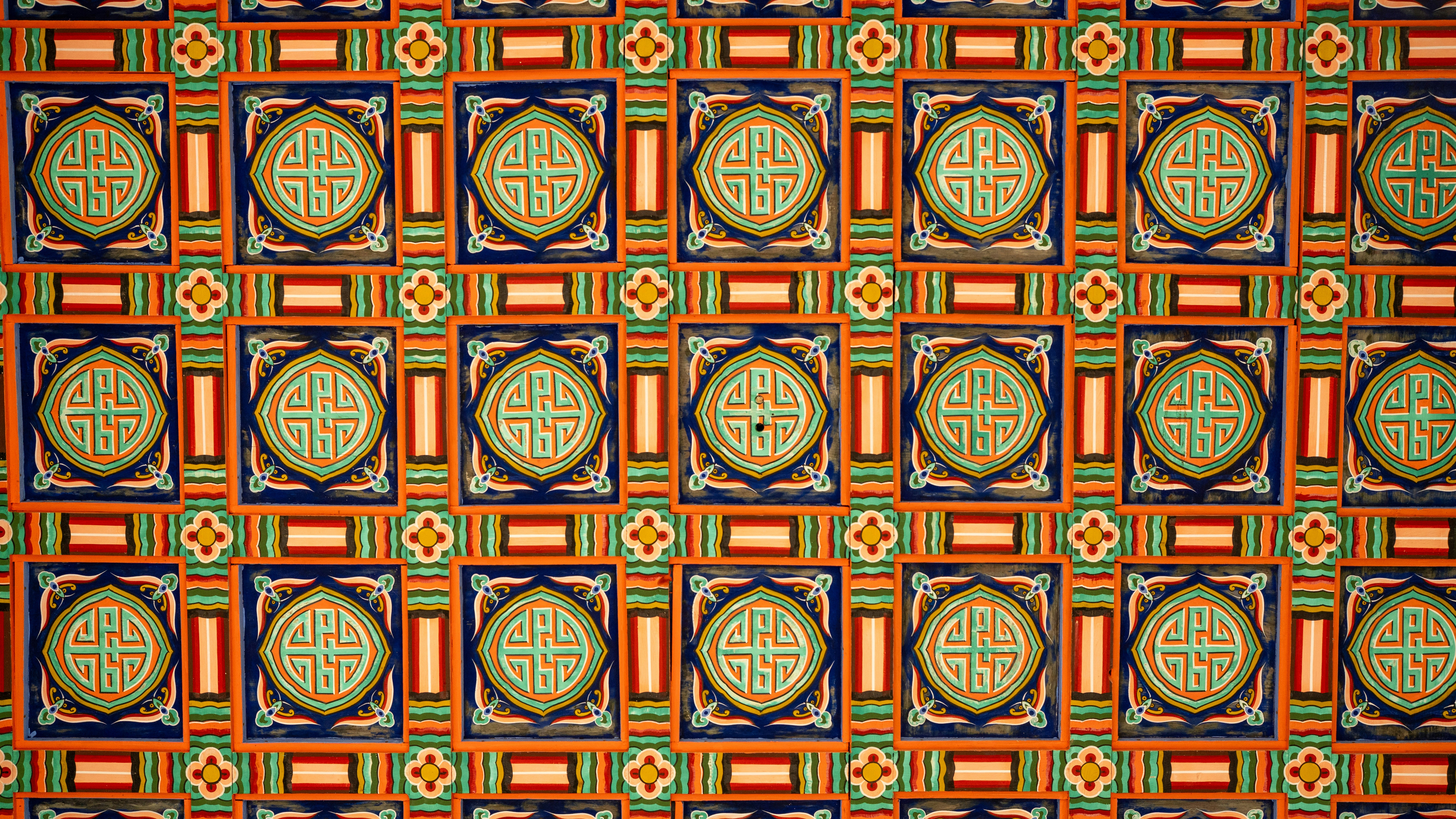 Geometric Tiled Rhythm: Repeating Medallions in Warm Terracotta