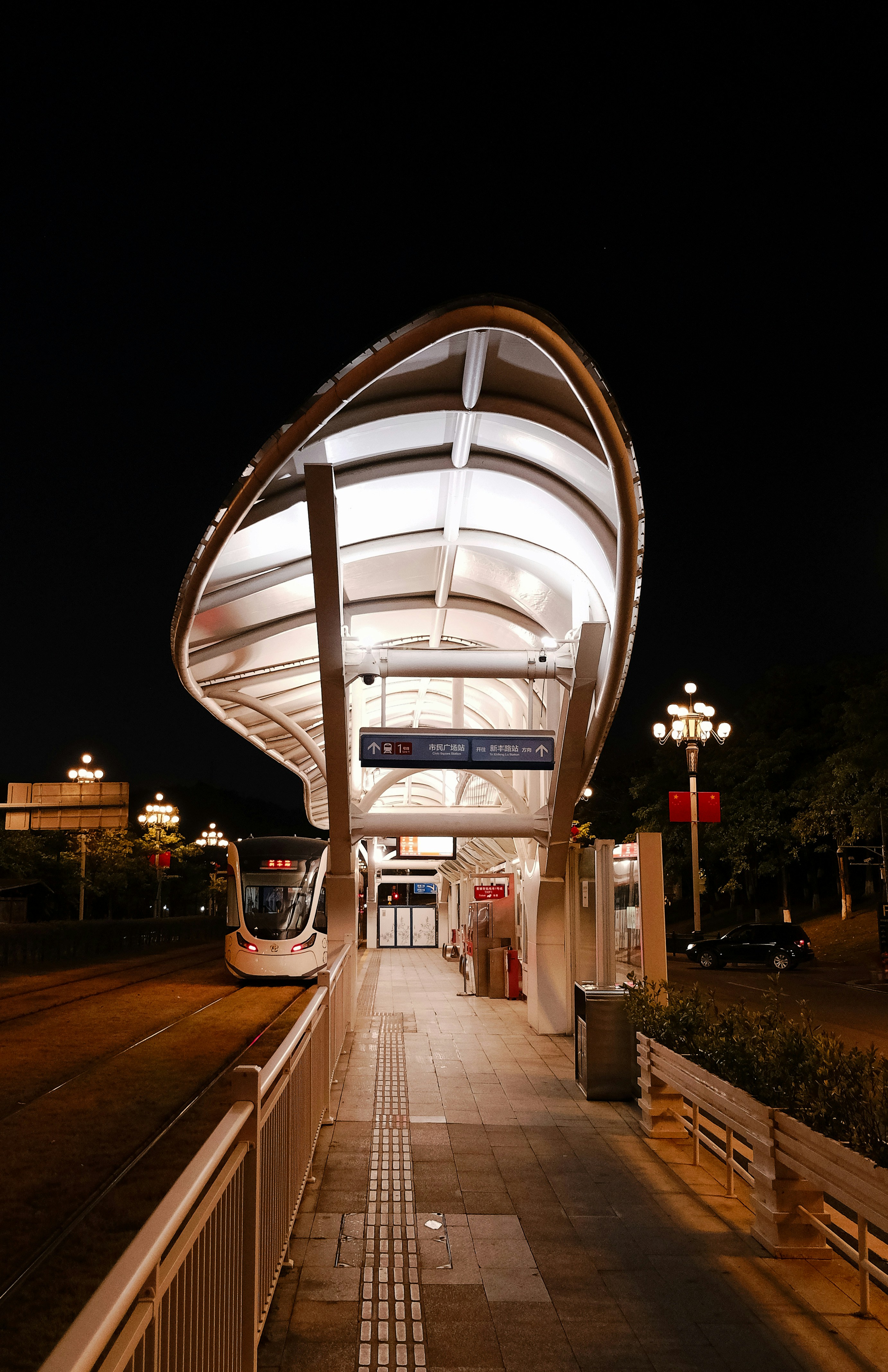 Night Platform: A Tranquil Truss Canopy Overhead