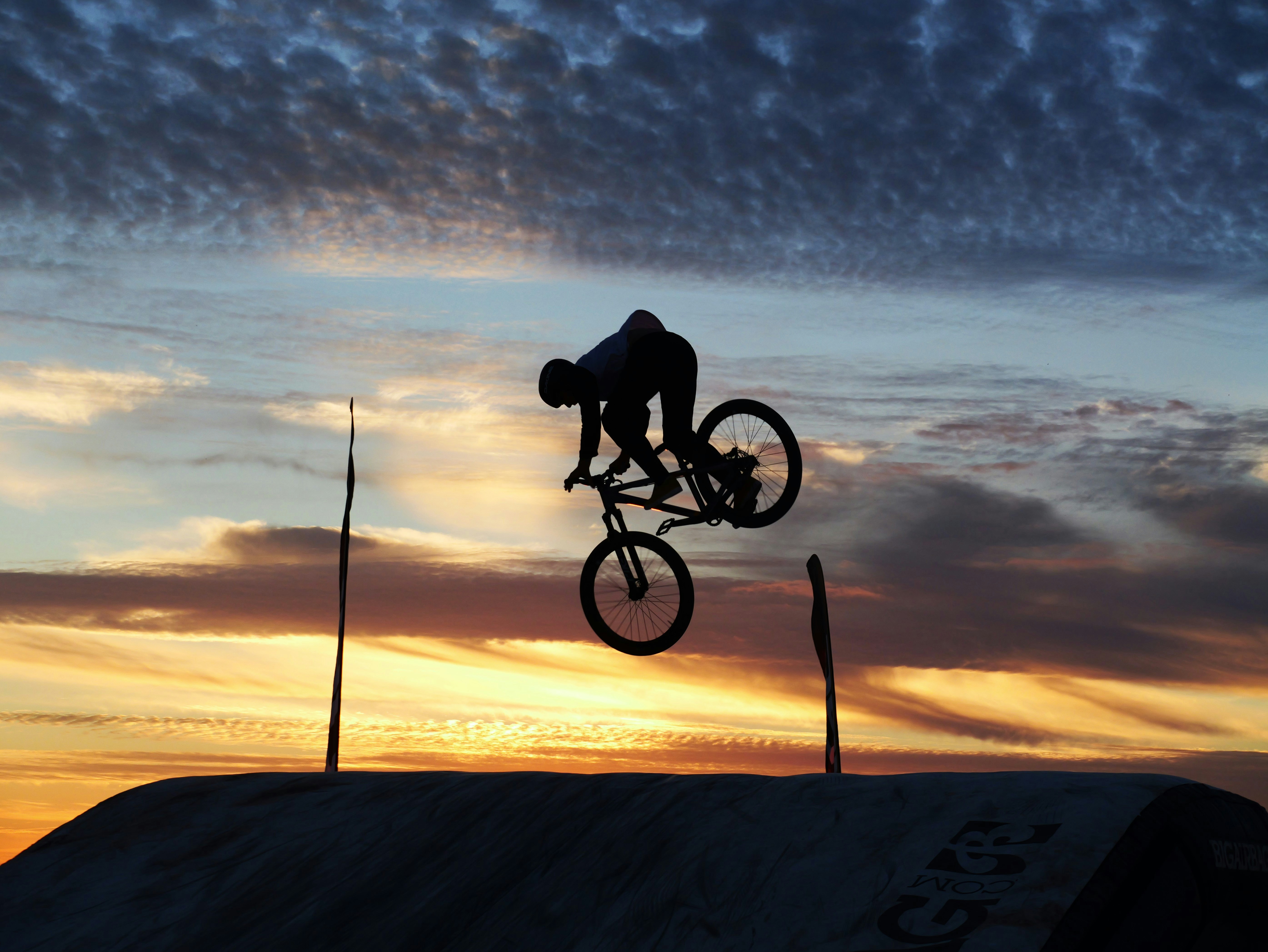 Midair Anthem: Rider Cresting a Sunset Ramp