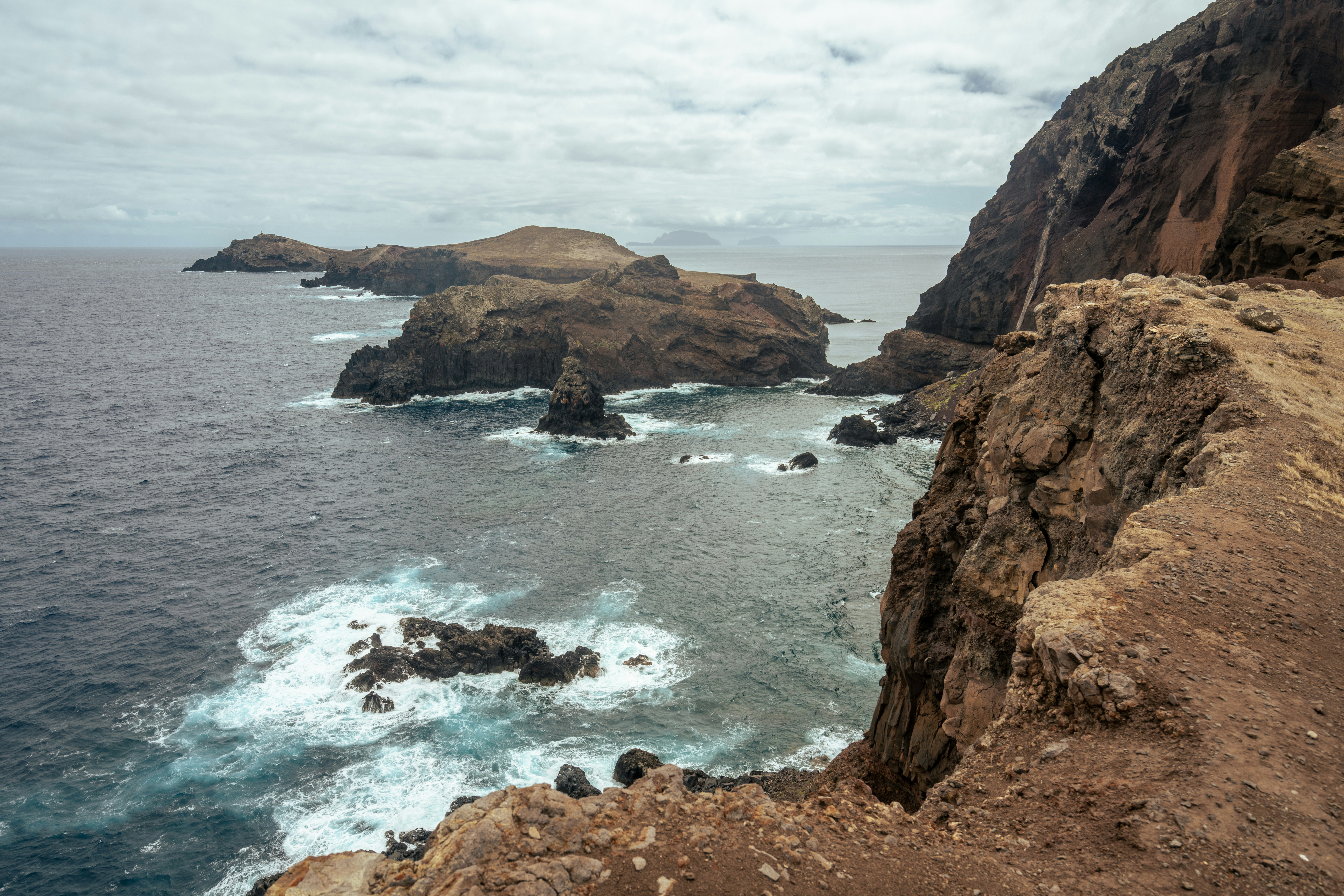 Cliffside Vista: A Rugged Ridge Over Turbulent Seas