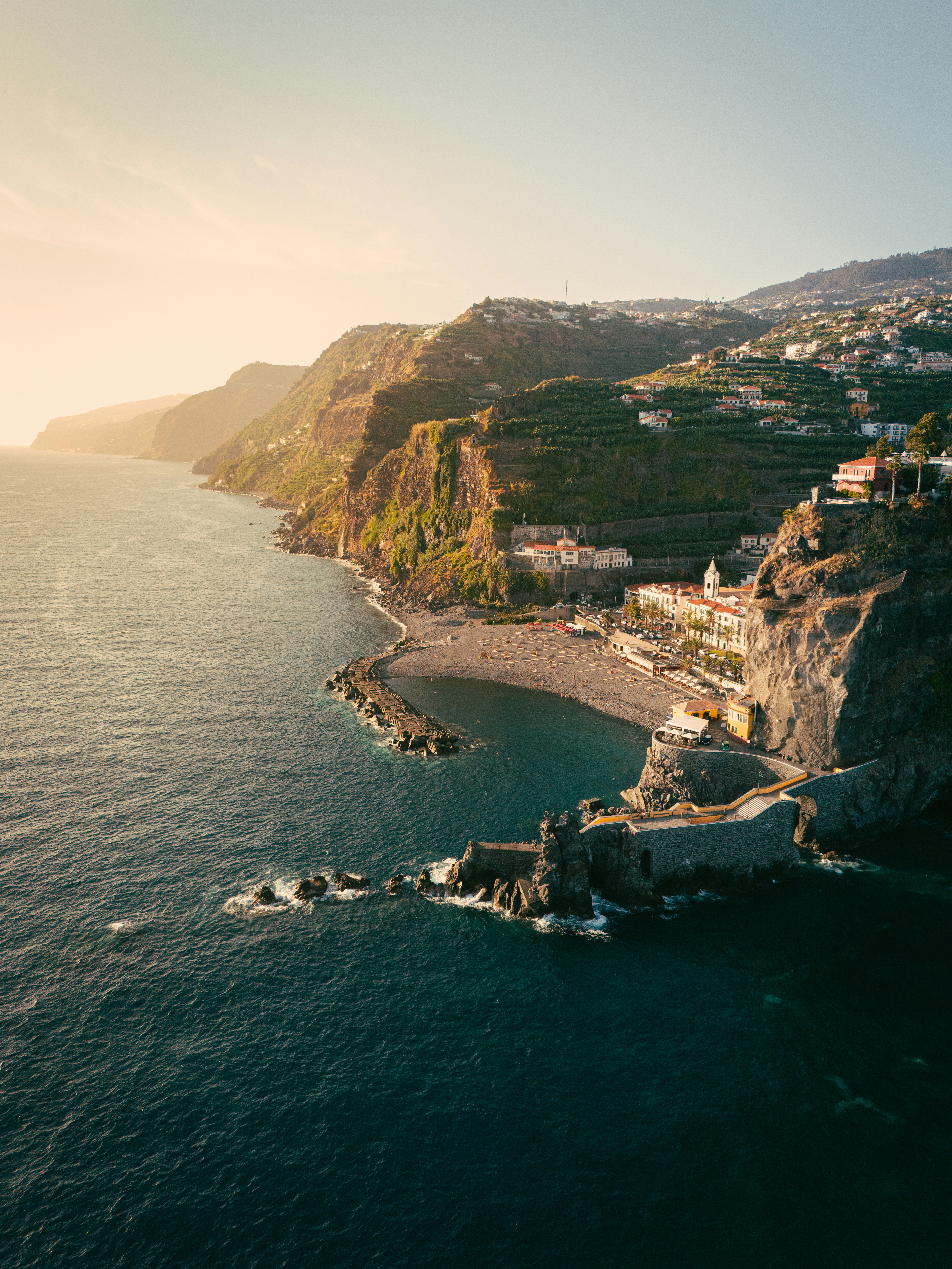 Cliffside Village Bathed in Golden Sea Breeze