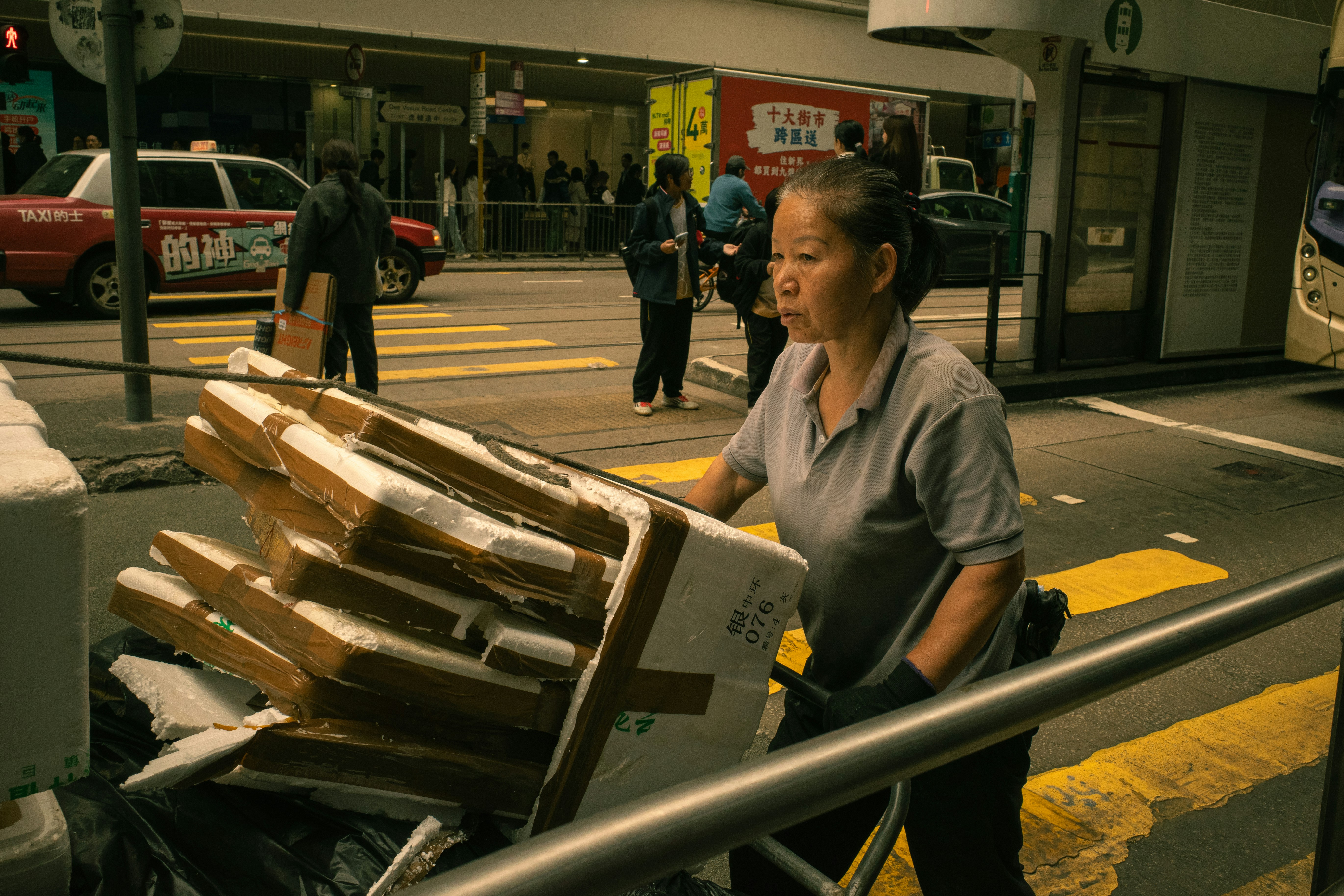 Cartful of Corrugated Cargo on a Busy Street