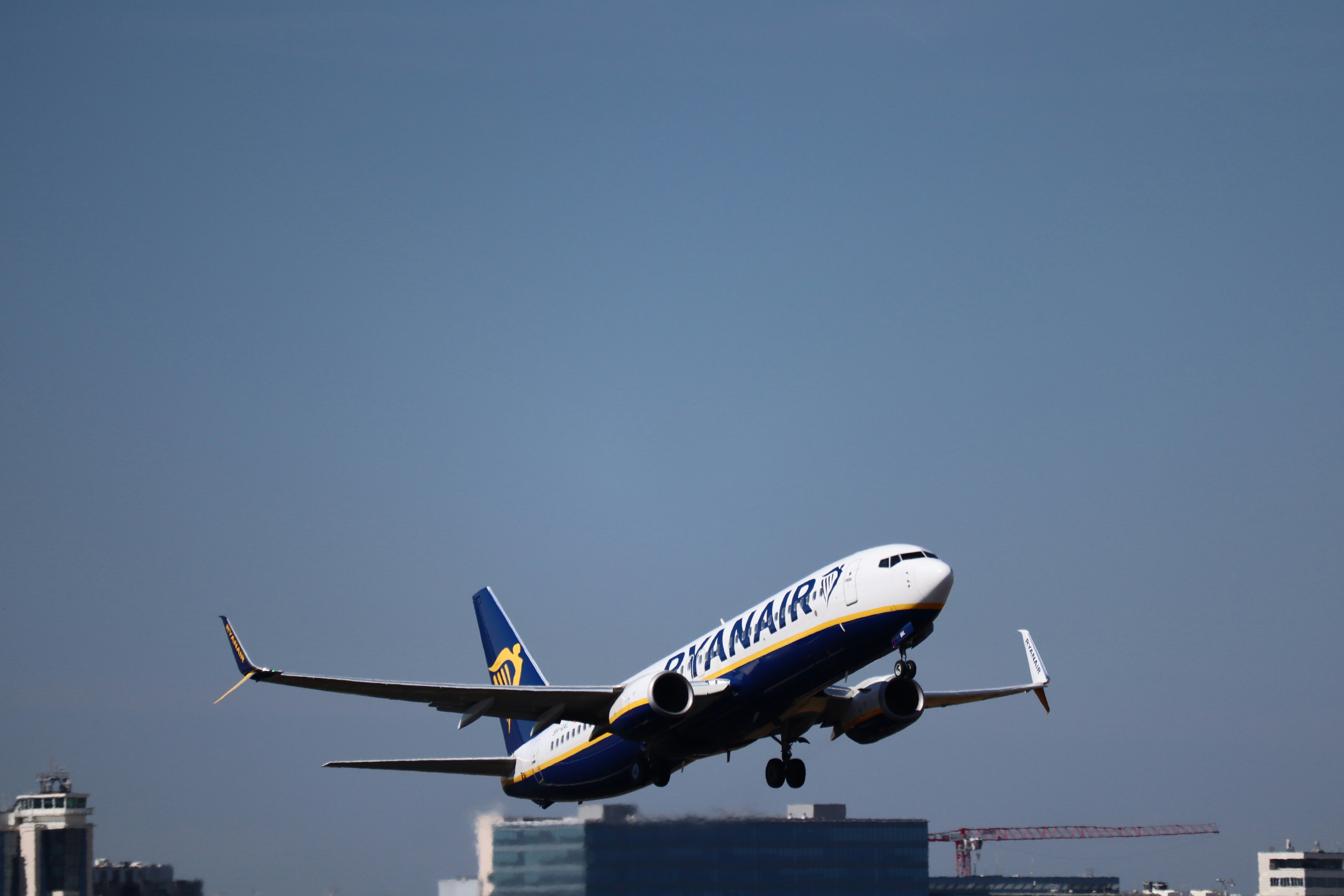 Ryanair B777-like Lifter: A Jet Breaks Free Over Urban Landscape