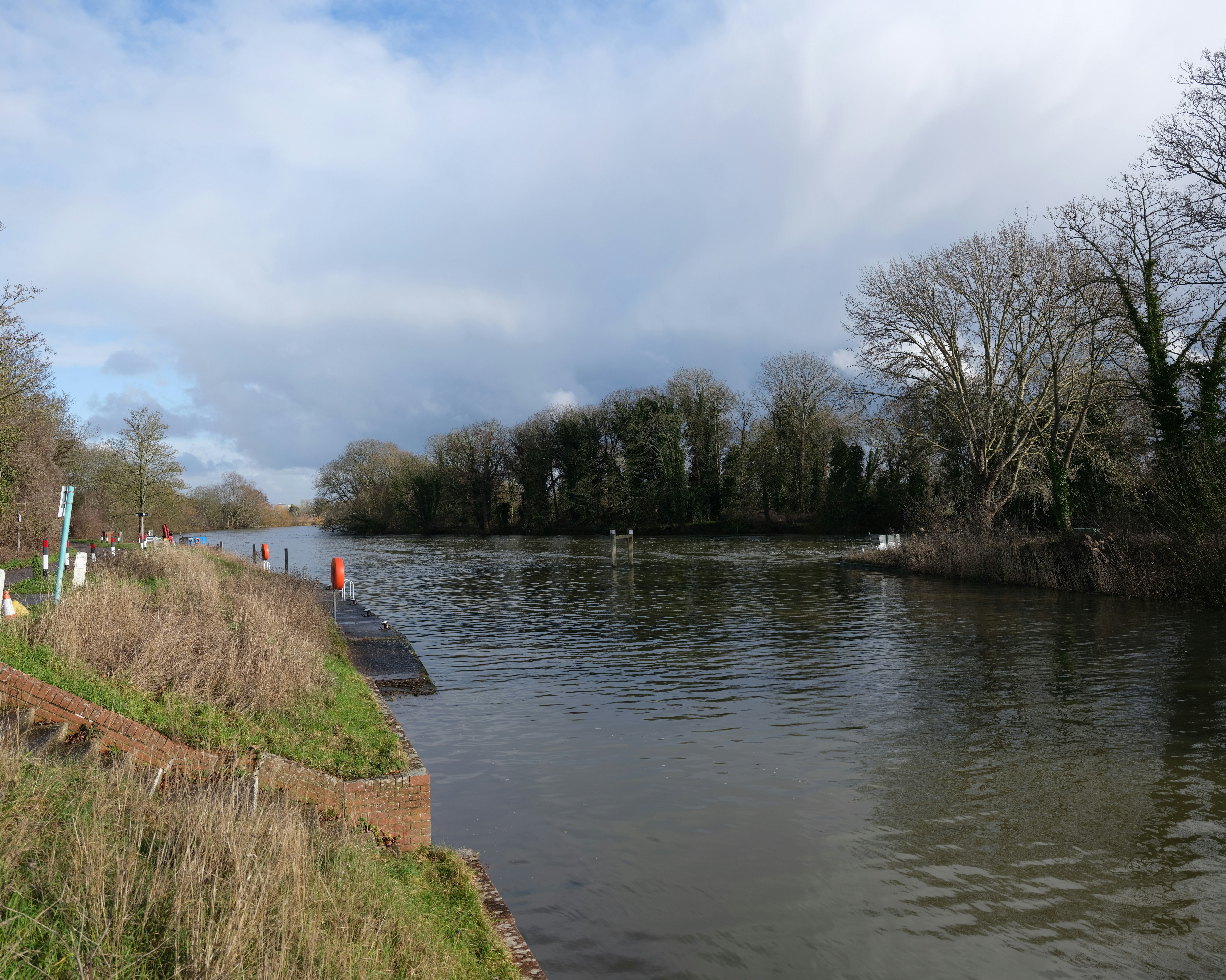 Riverbank Edge with Distant Isle and Narrow Path