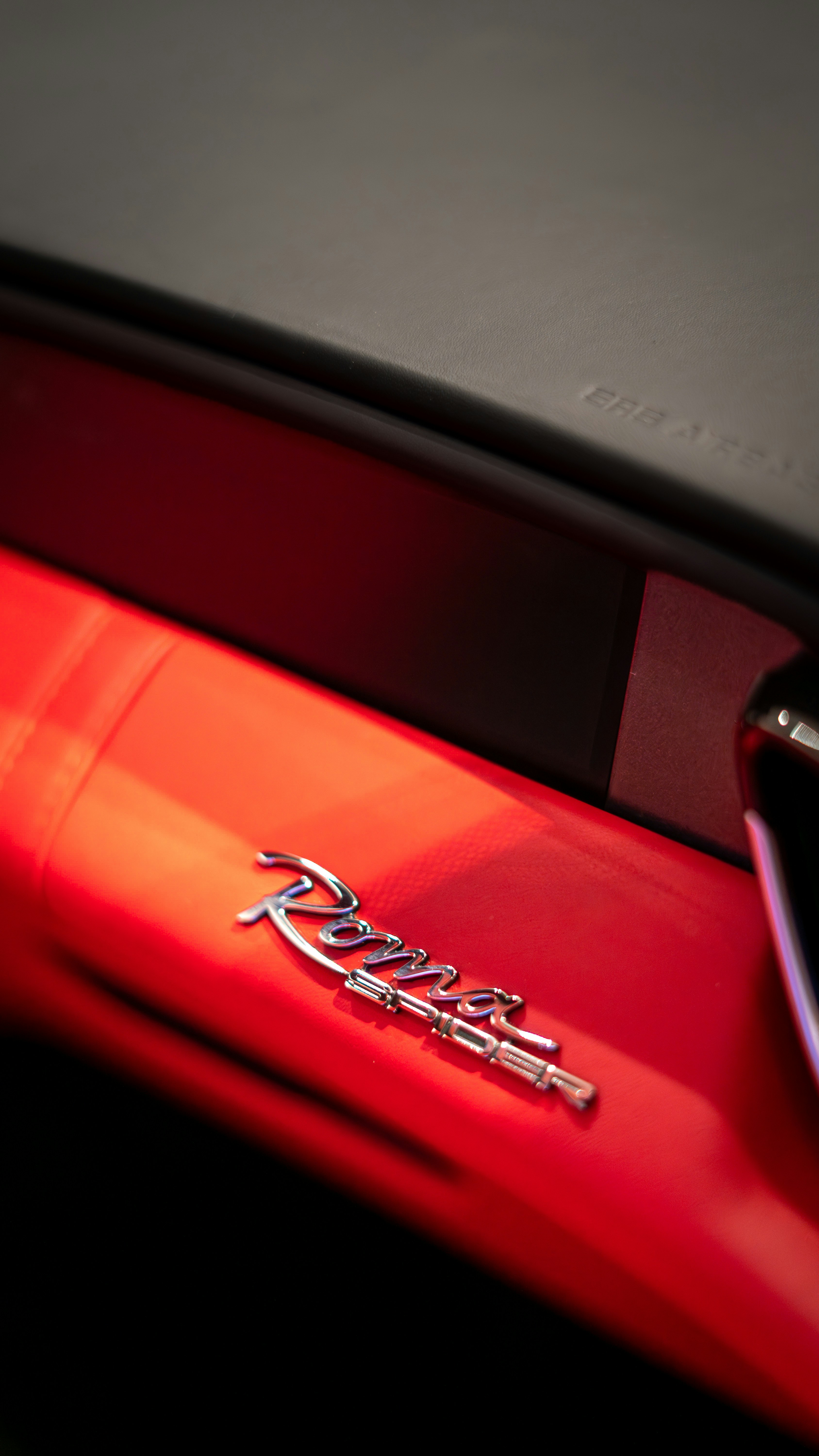 Red Badge, Dark Curves: A Close Portrait of a Ferrari Roma Hinge