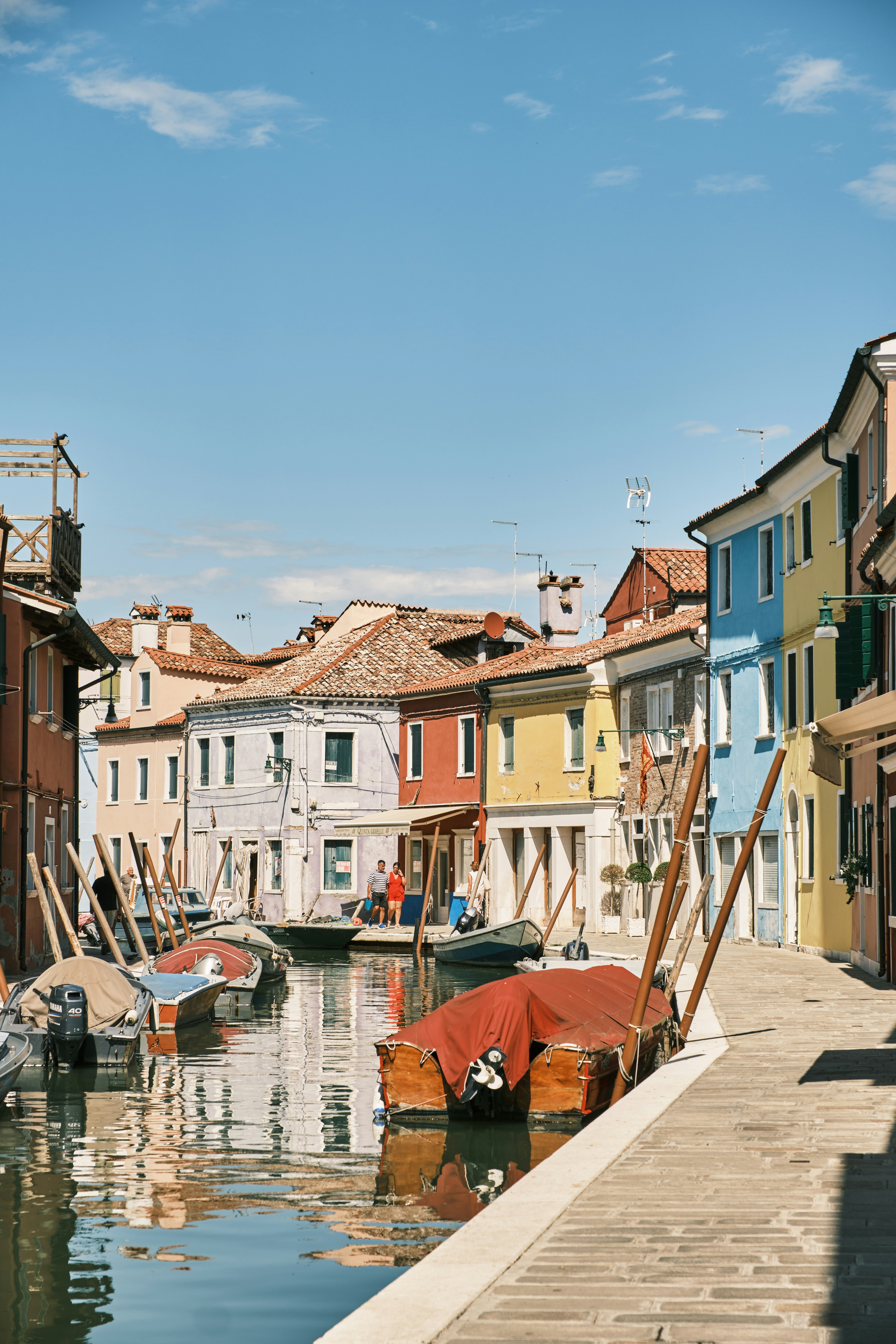 Colorful Venice-like Canal Row with Boats and Bright Facades