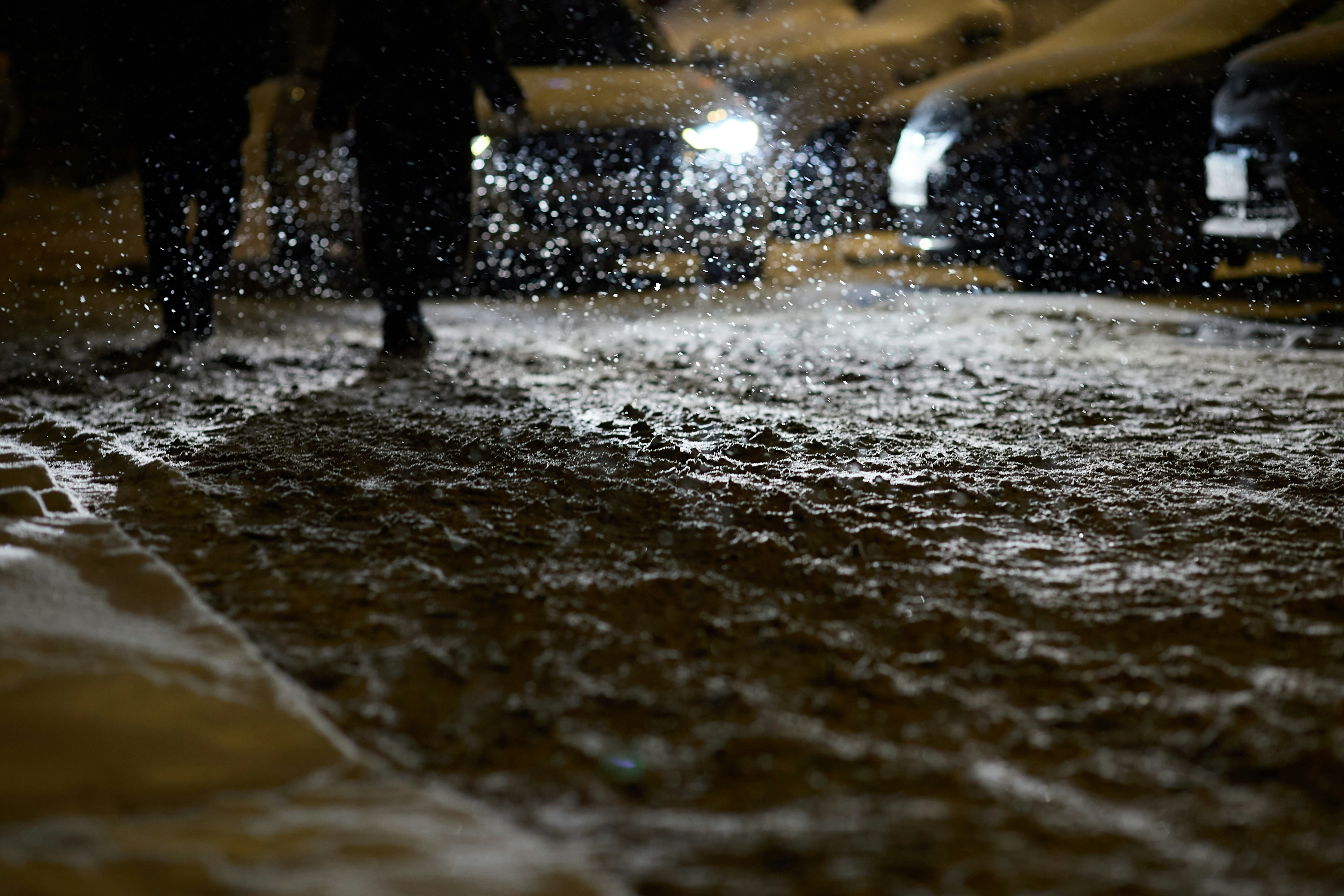 Snow Sprites in the Streetlights: Night Snowfall Beneath Footsteps