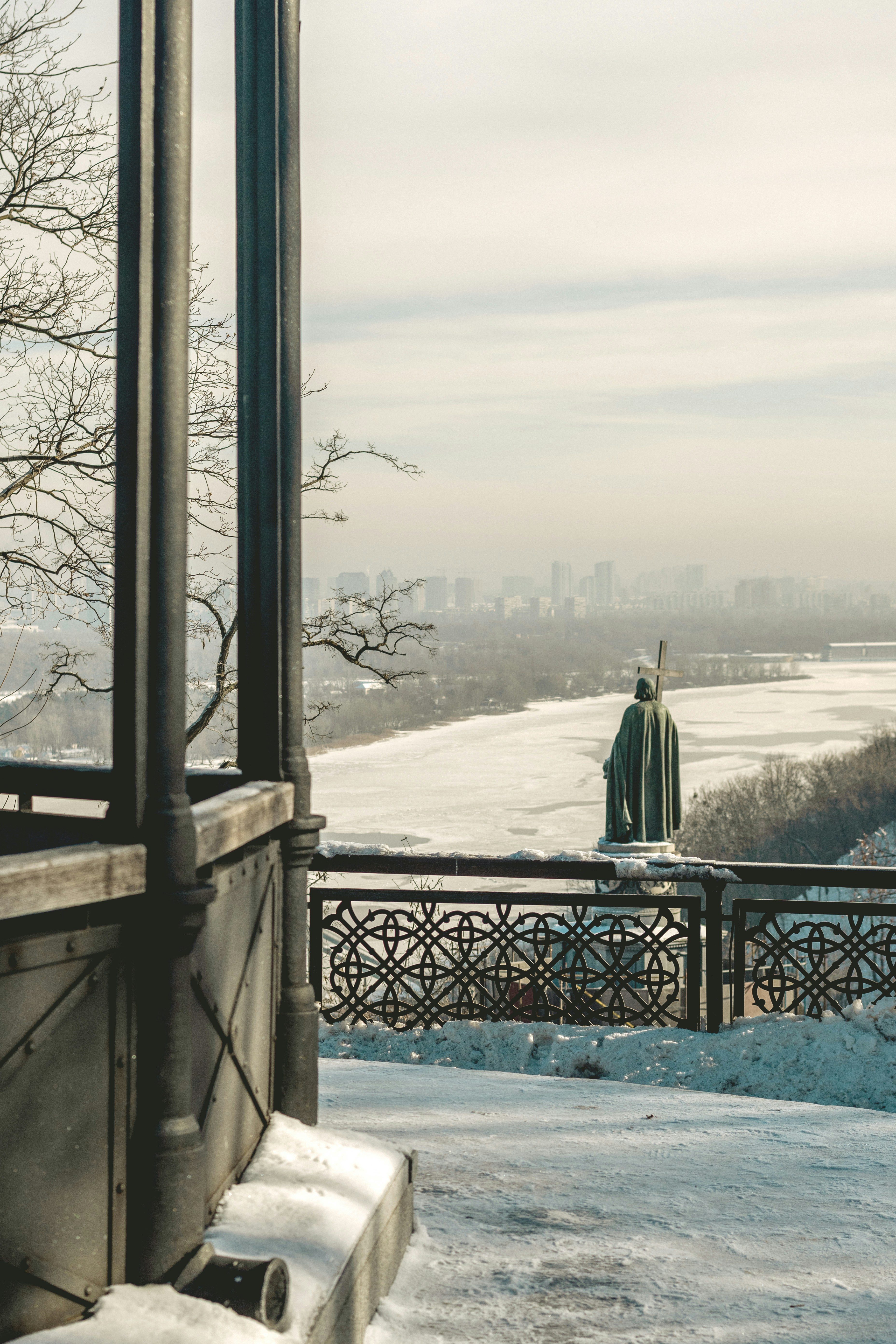 Snowy Terrace with Distance Statue and Distant City