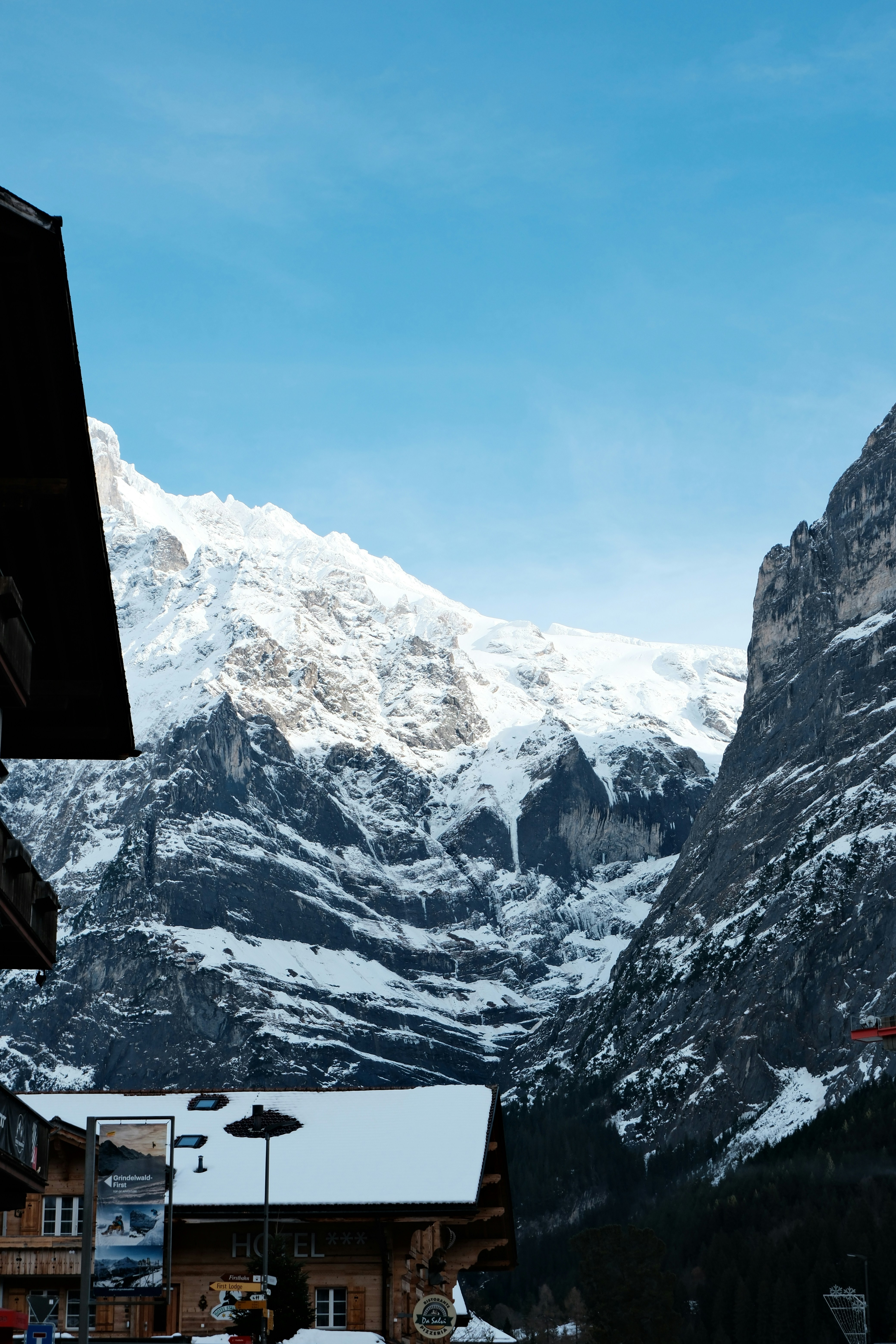 Snow-Crowned Peaks Above a Alpine Village