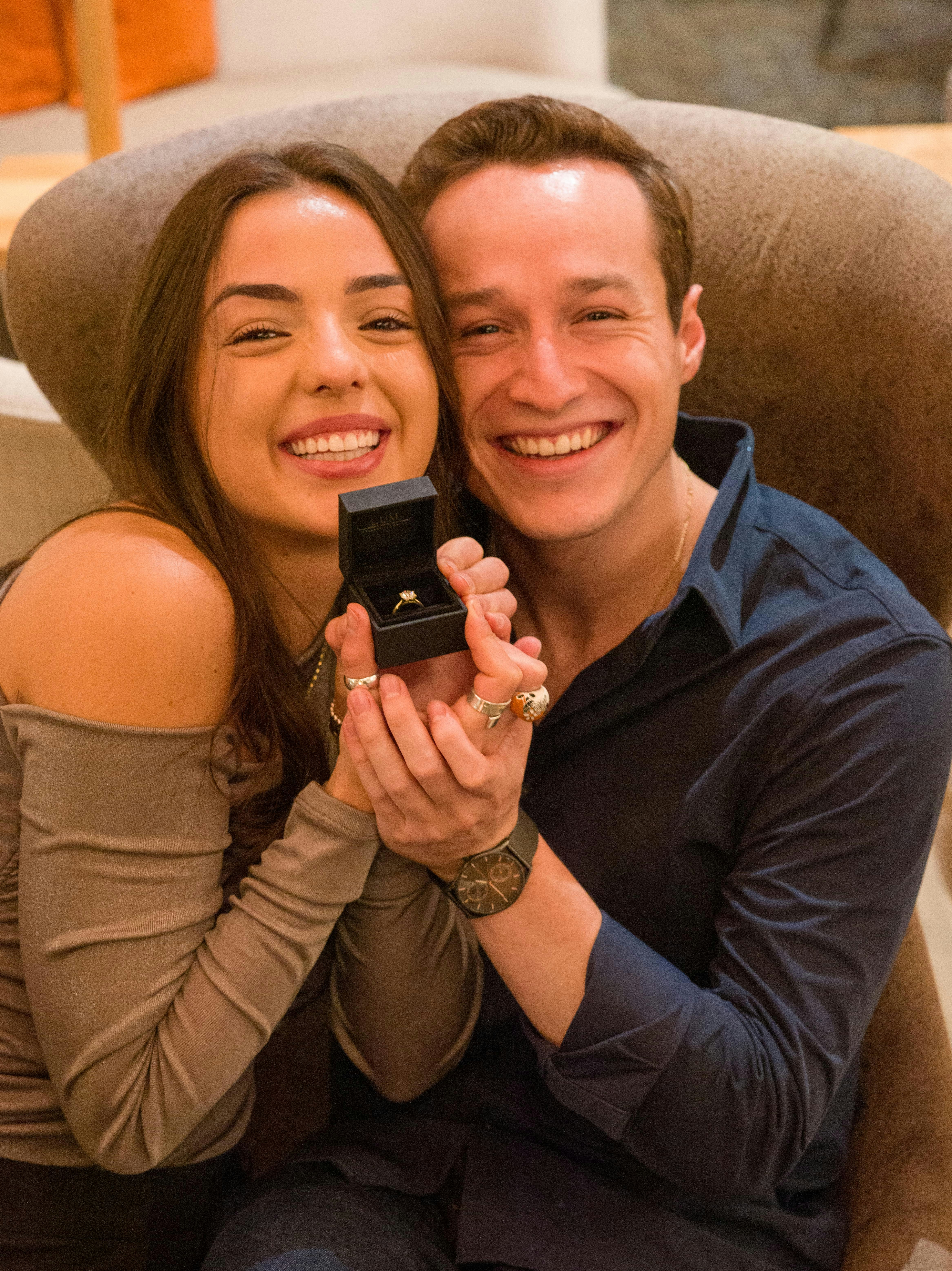 Silent Promise: Couple Celebrates with Ring Moment