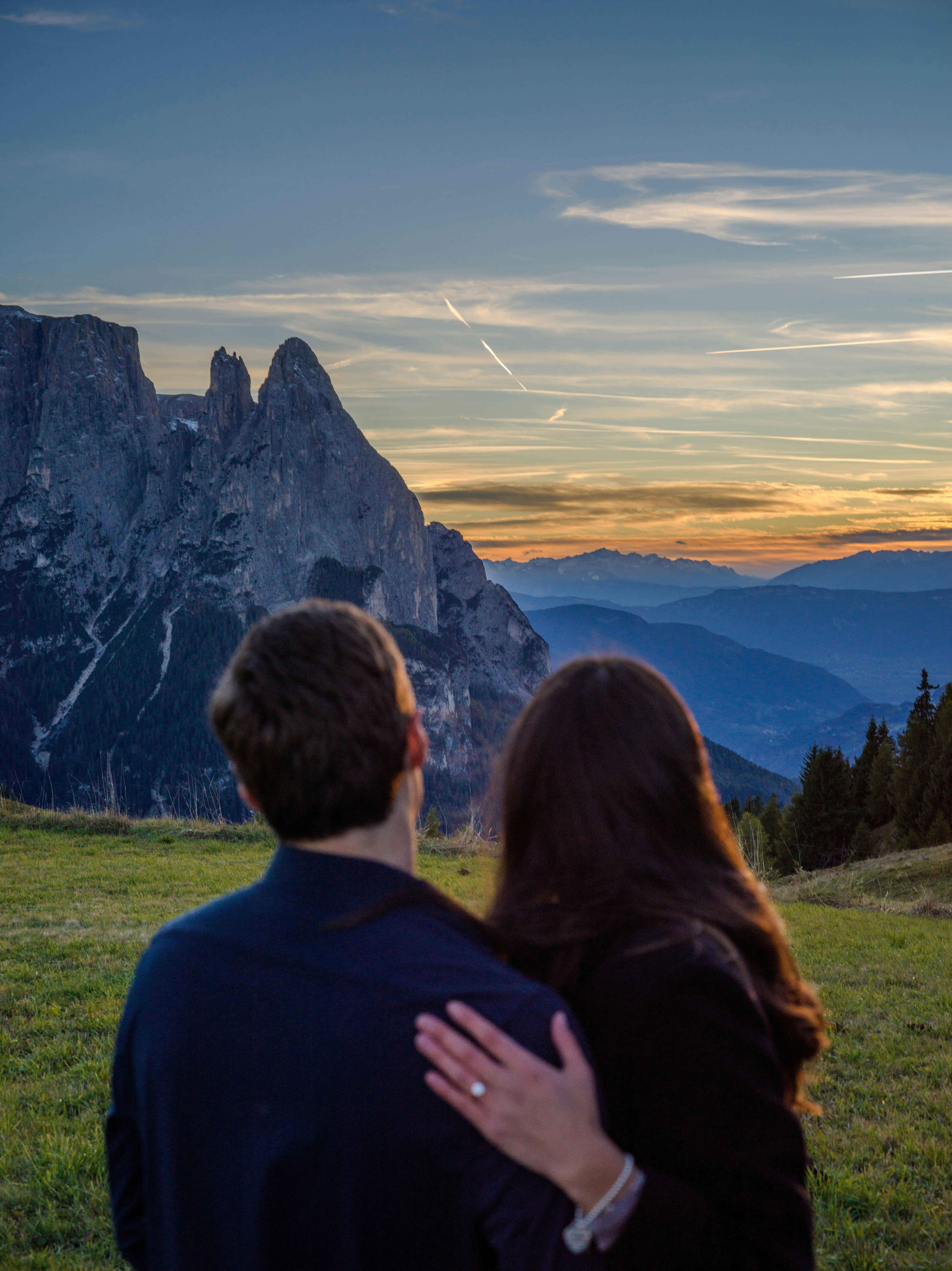 Toward the Sunset Ridge: A Couple Contemplates the Alpine Vista