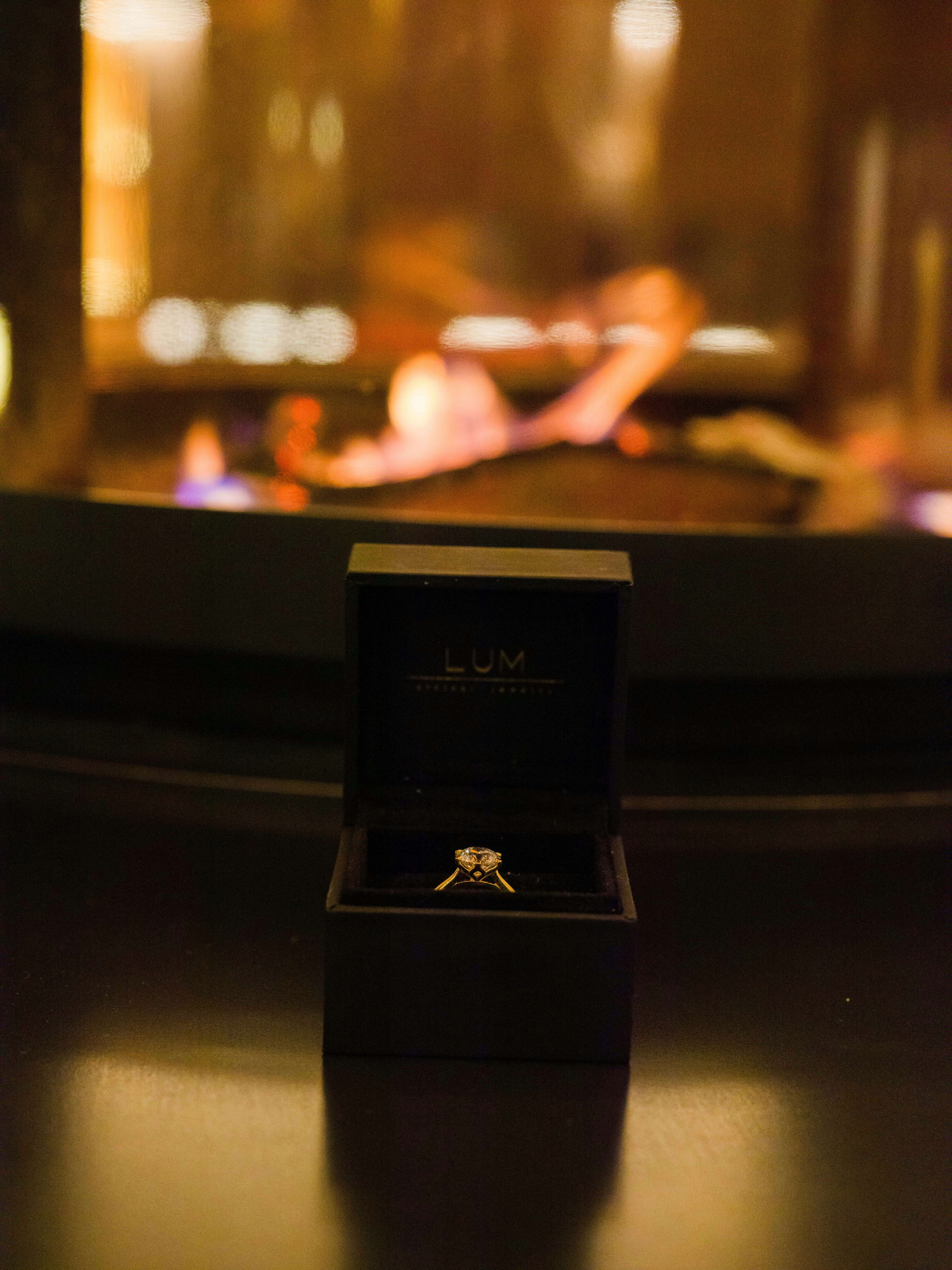 Halo Ring in a Softly Lit Boutique: a Diamond in Focus