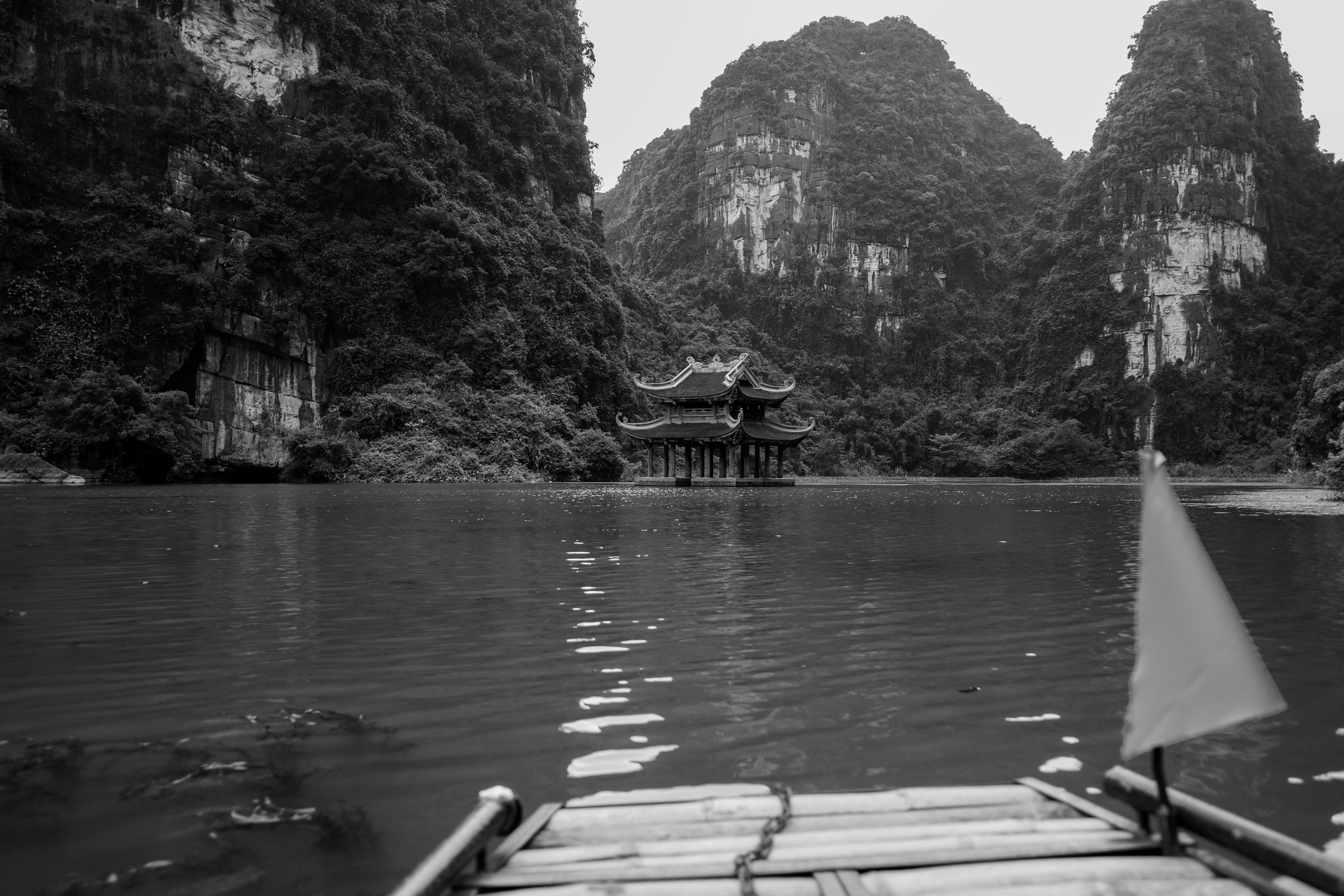 Floating Pavilion Amid Limestone Giants