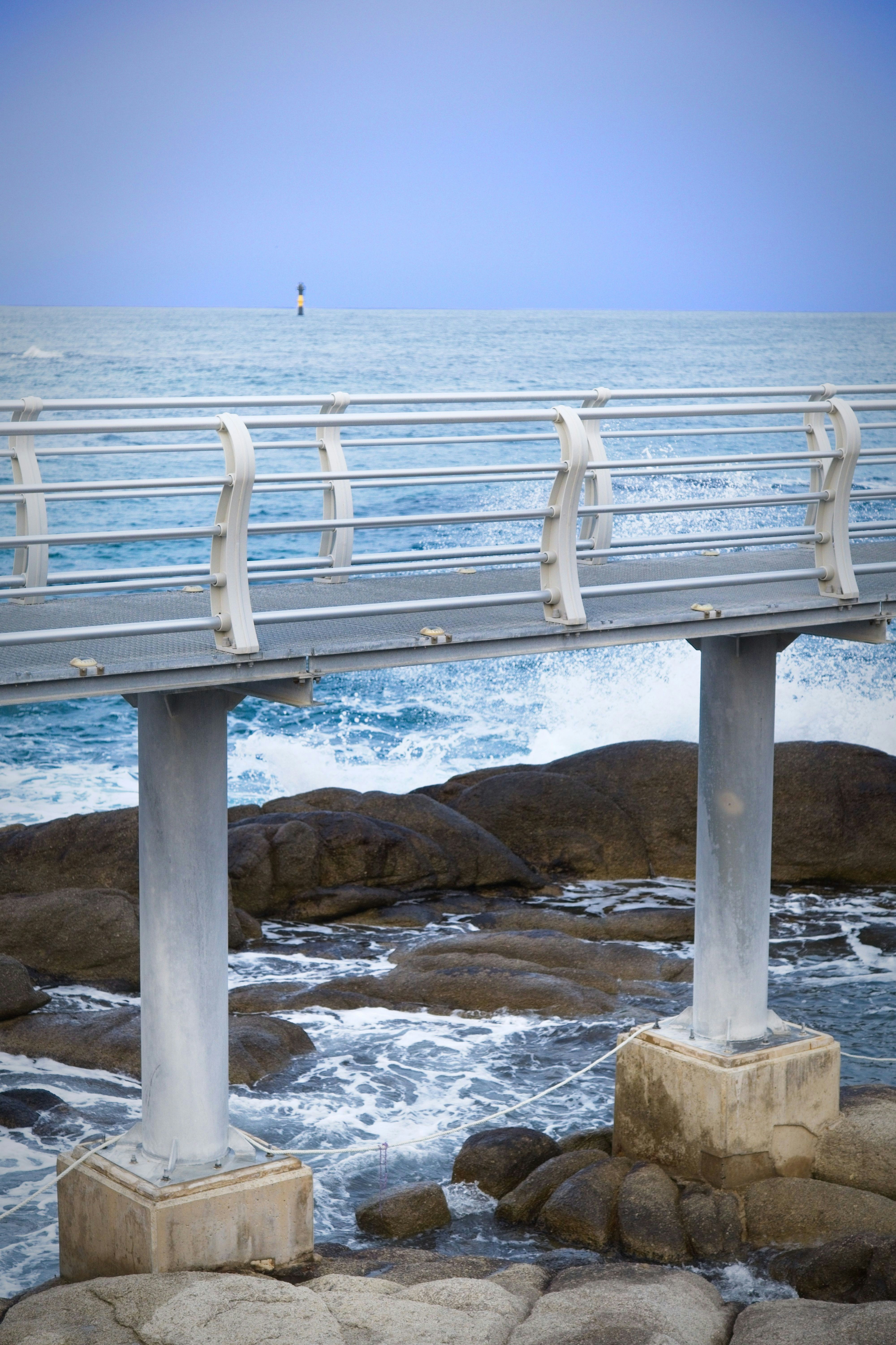 Seascape Pier: A Quiet Moment Above the Rolling Tide