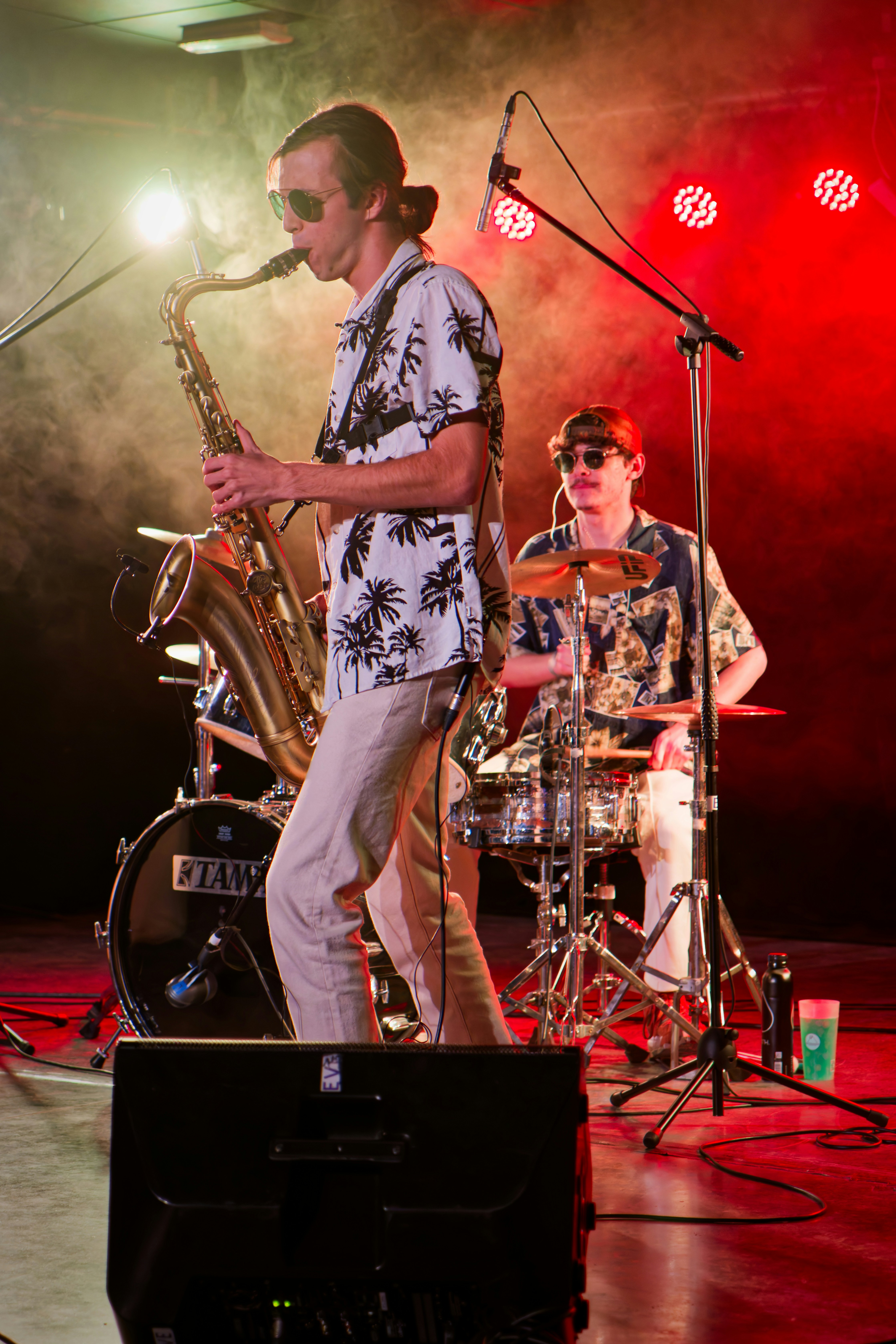Saxophone Serenade: Tropical Vibes Under Stage Lights