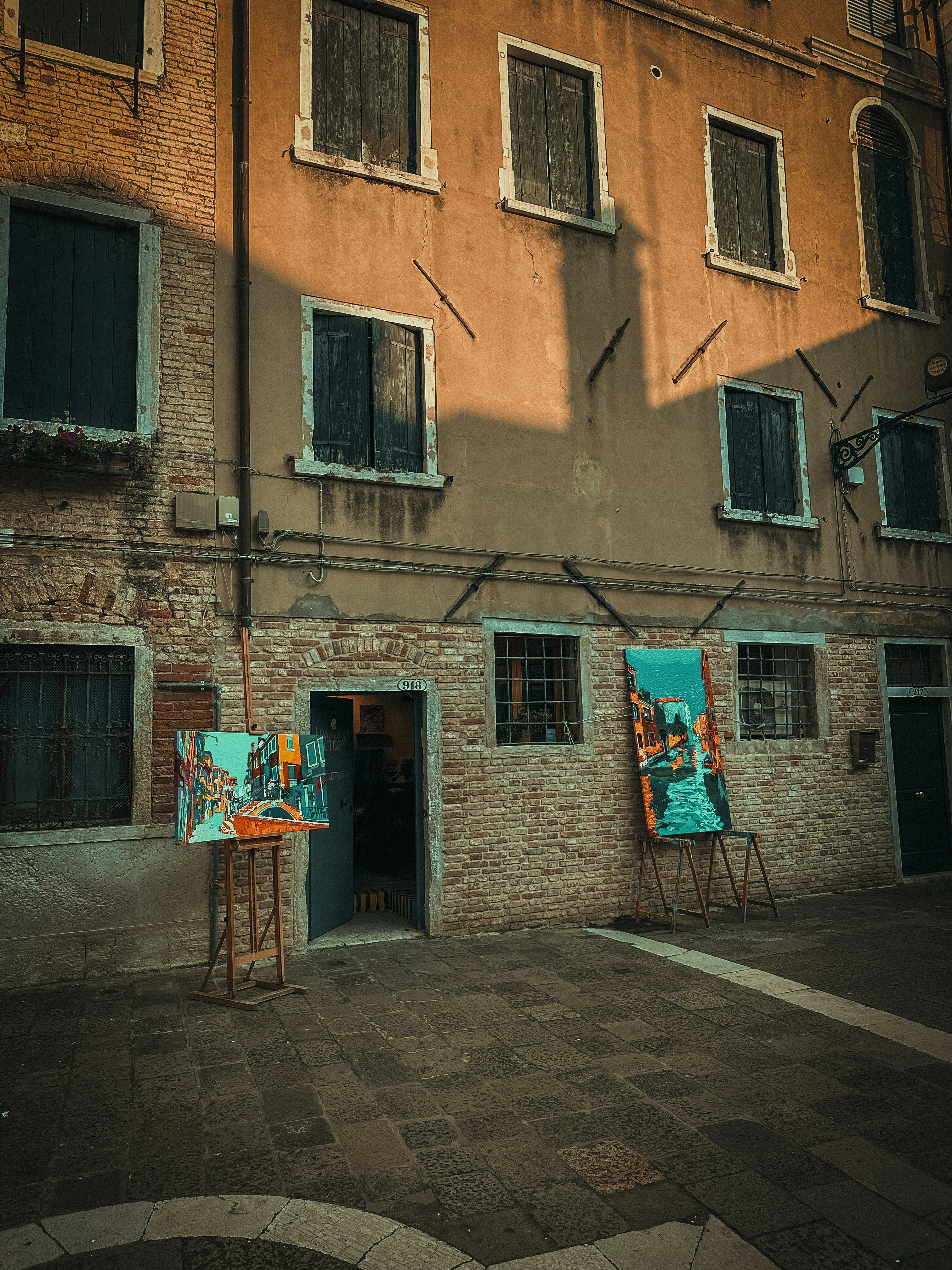Painted Courtyard: Street Art in a Weathered Facade