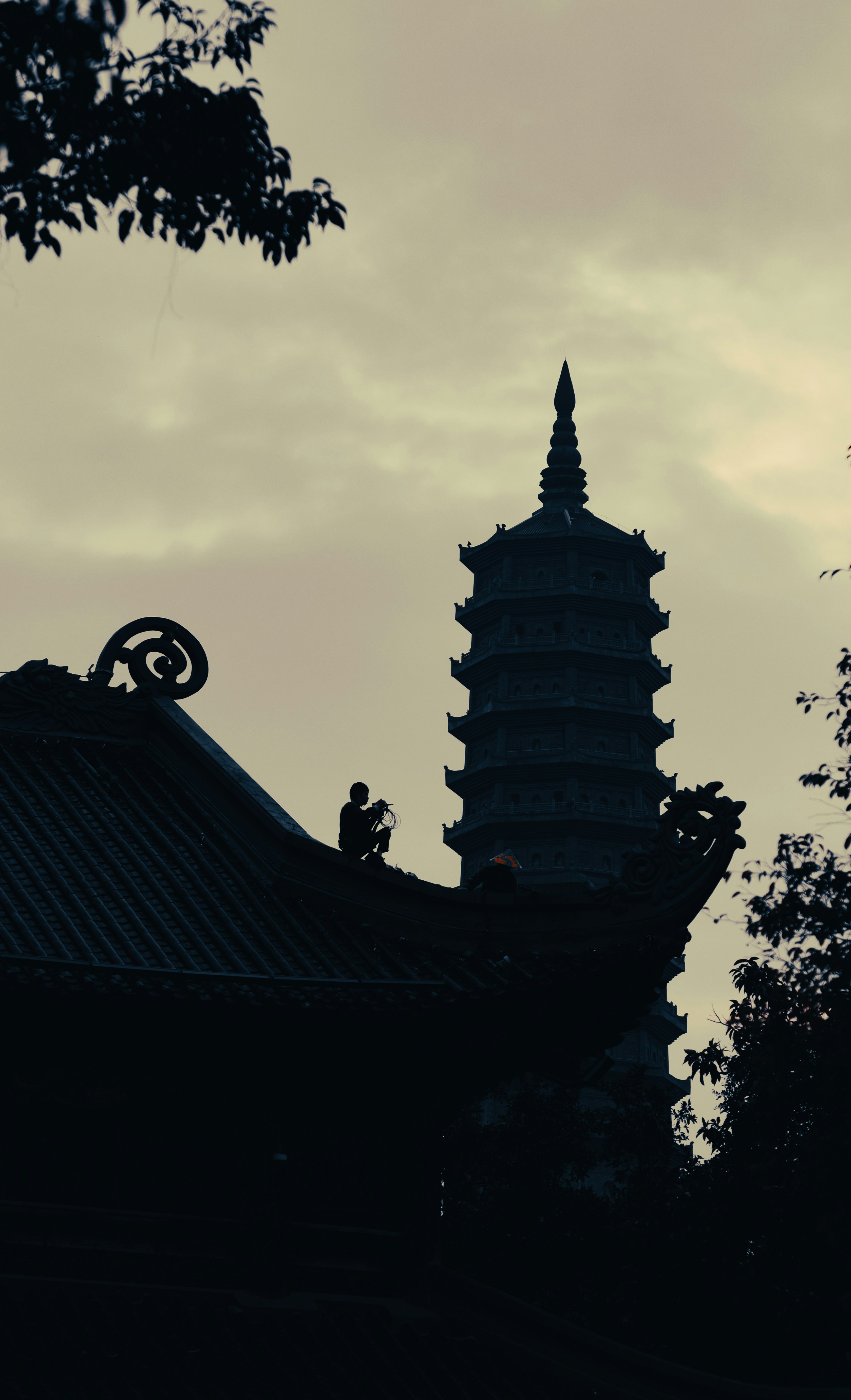 Silhouette of a Pagoda Against a Soft Evening Sky