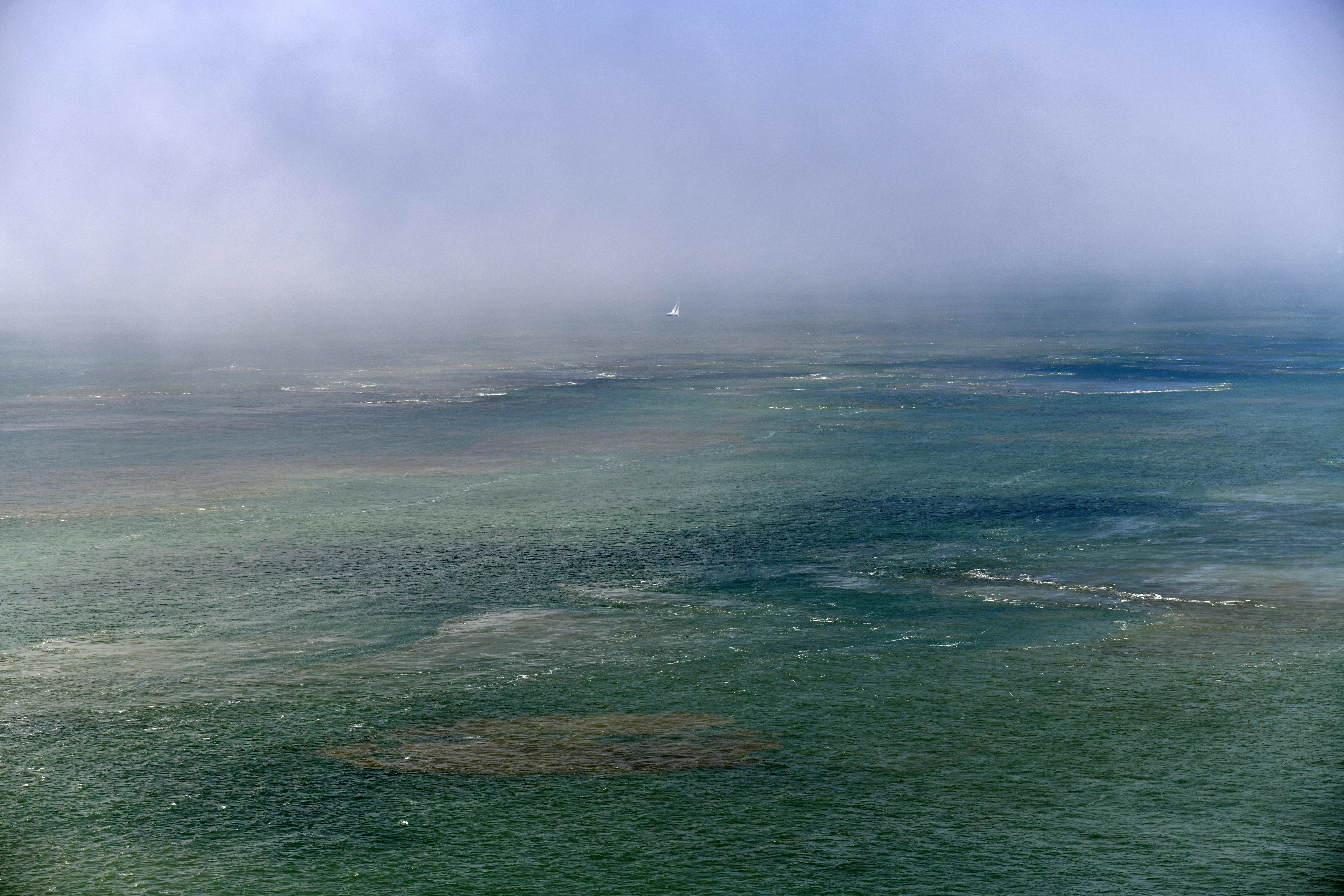 Mist over a Quiet Seascape: Horizon Hidden by Low Clouds