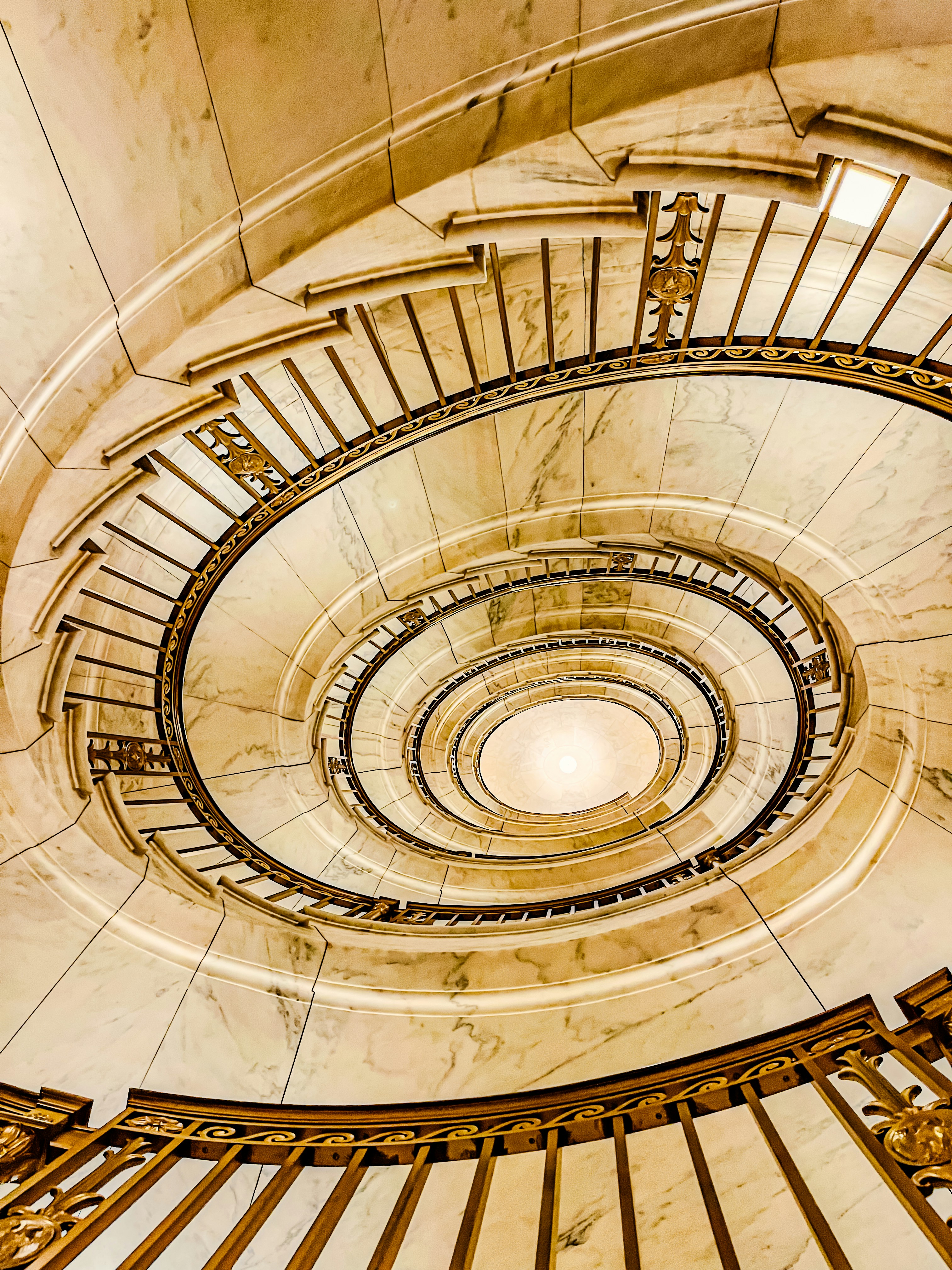 Spiral Marble Staircase: A Luminous Descent into Geometry