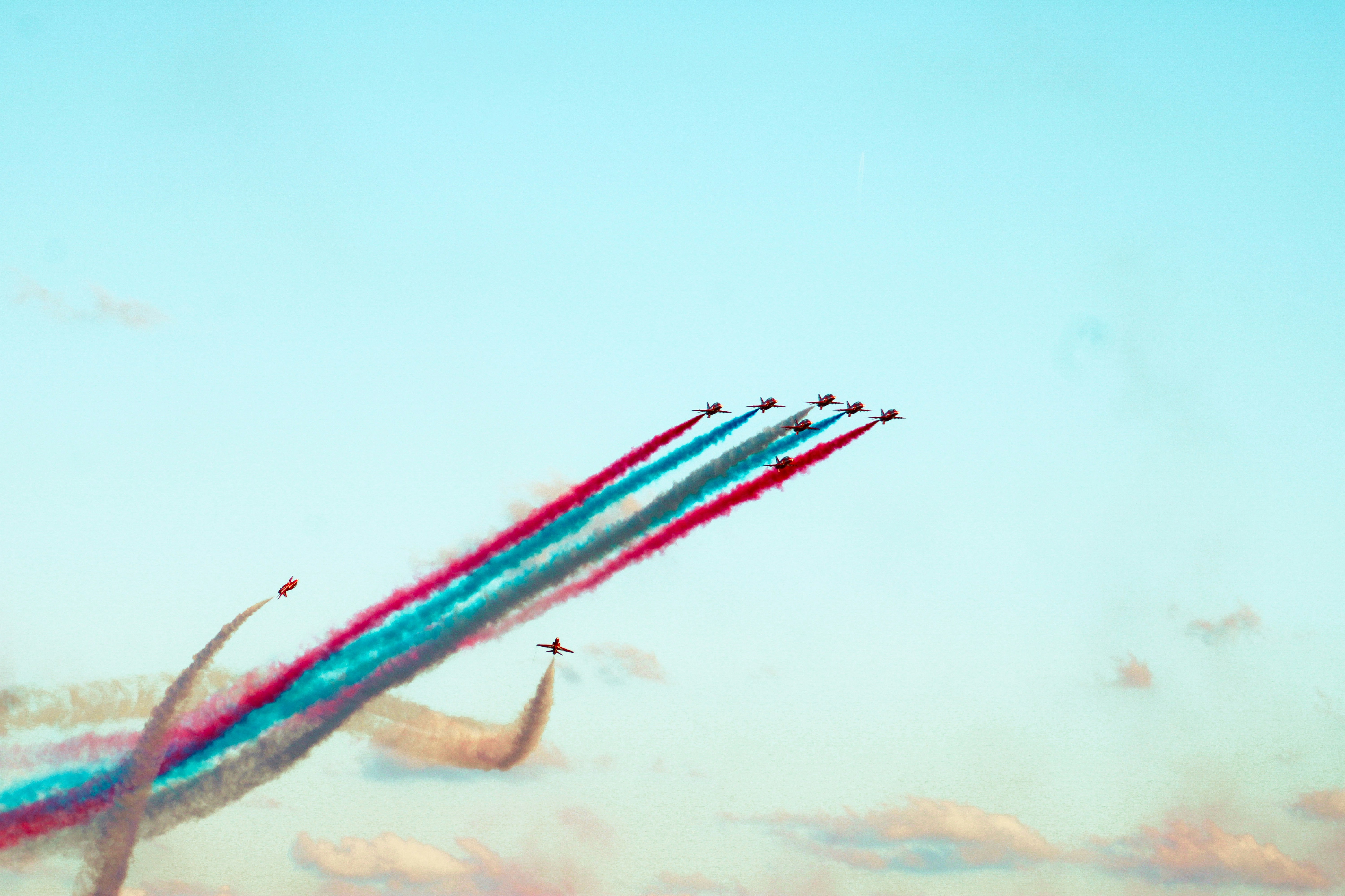 Skyward Smoke Trails: A Fleet of Colorful Air Parade