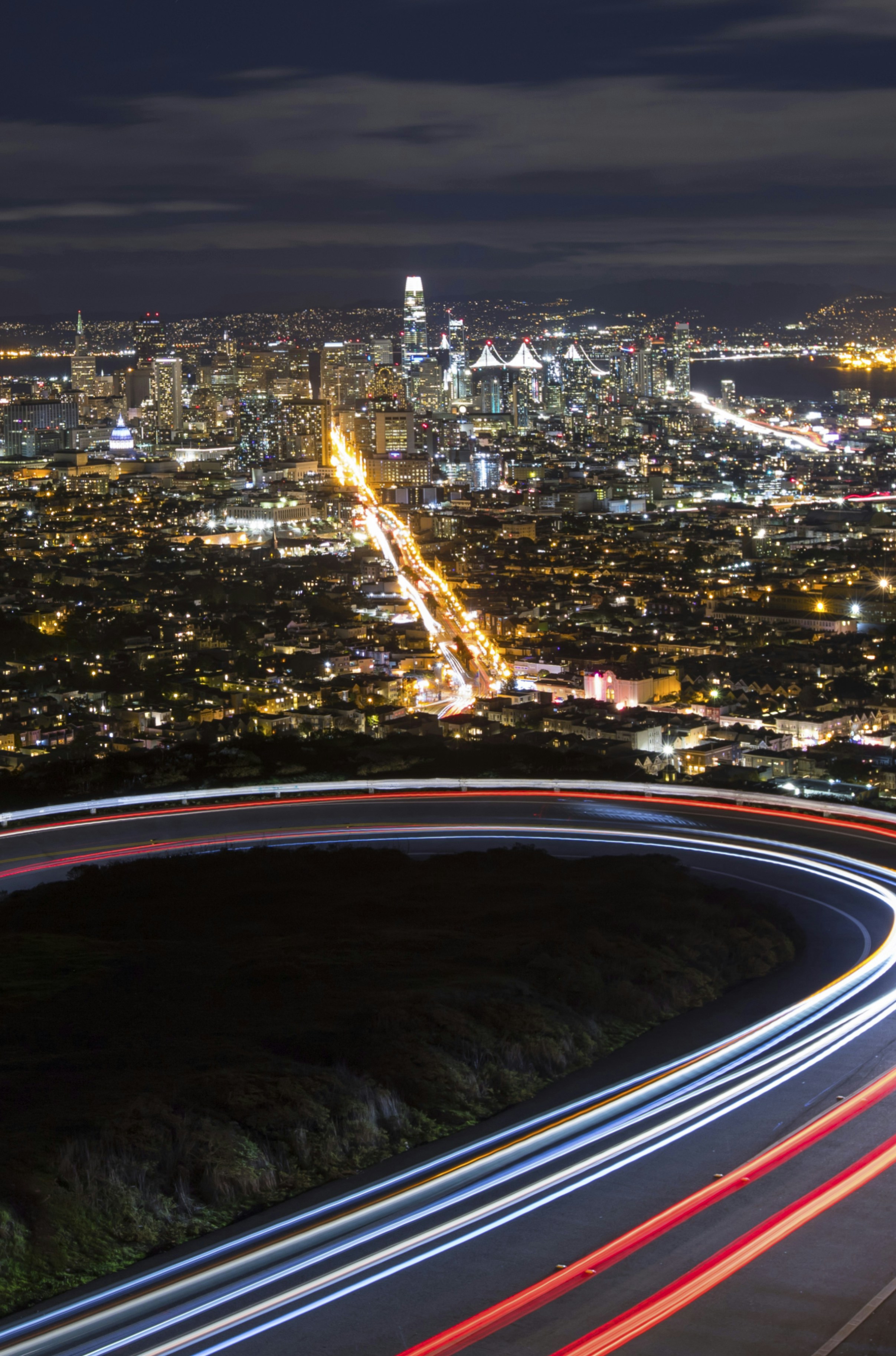 City Lights in Motion: Nighttime Spiral over a Bay Area Ridge