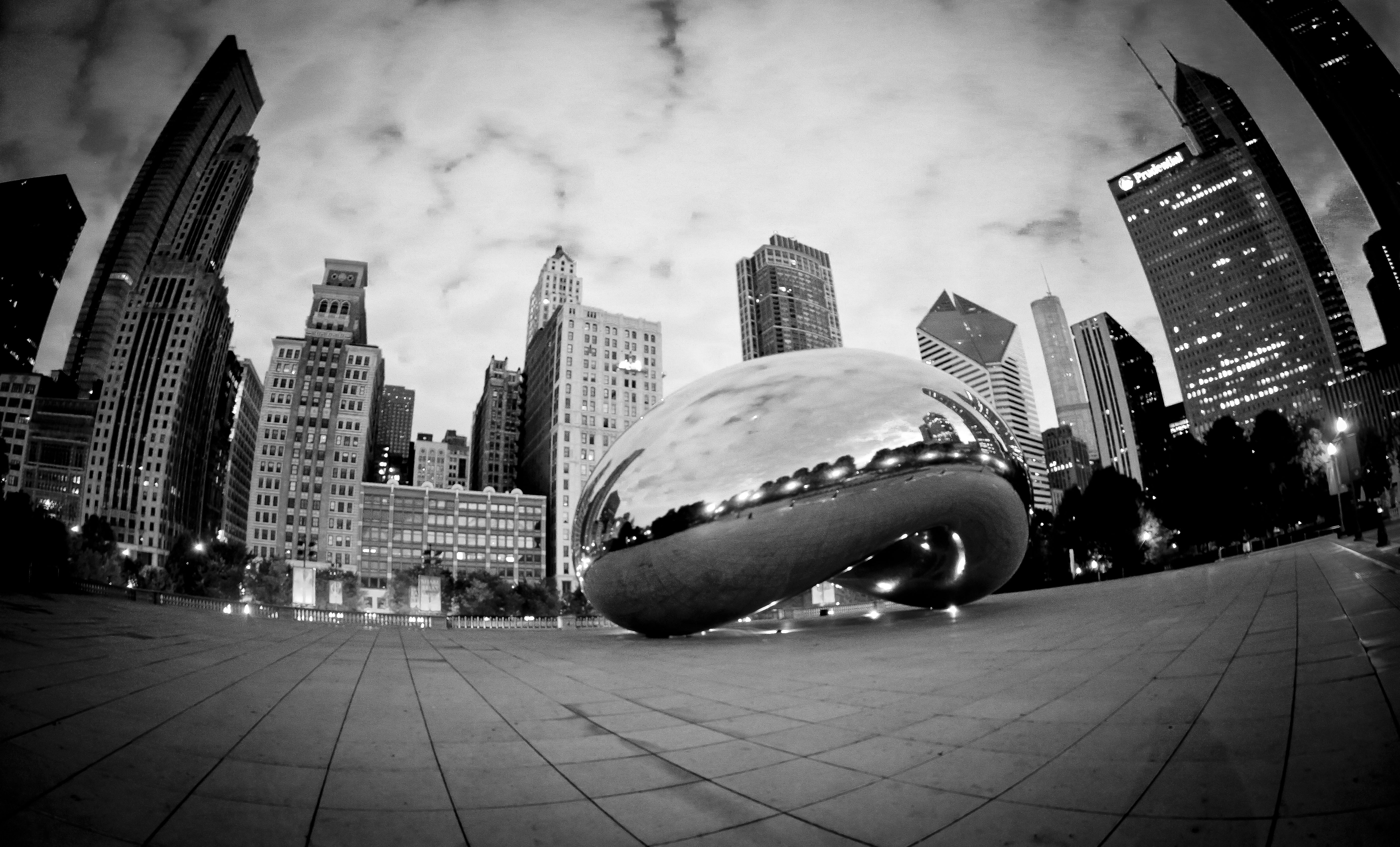 Reflections of Steel: Cloudy Cityscape Encircling a Floating Arch